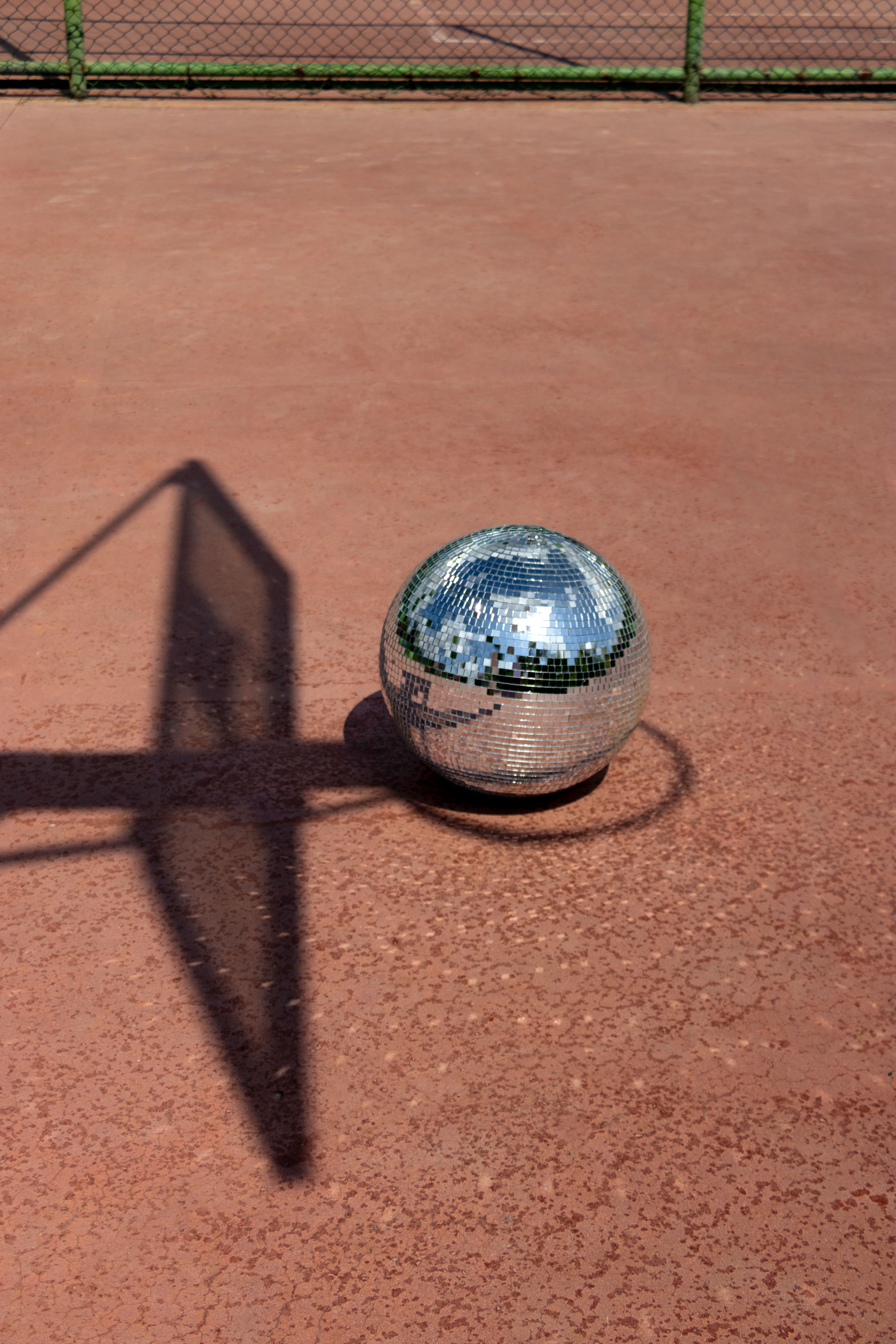 A Disco Ball Lying on the Ground · Free Stock Photo