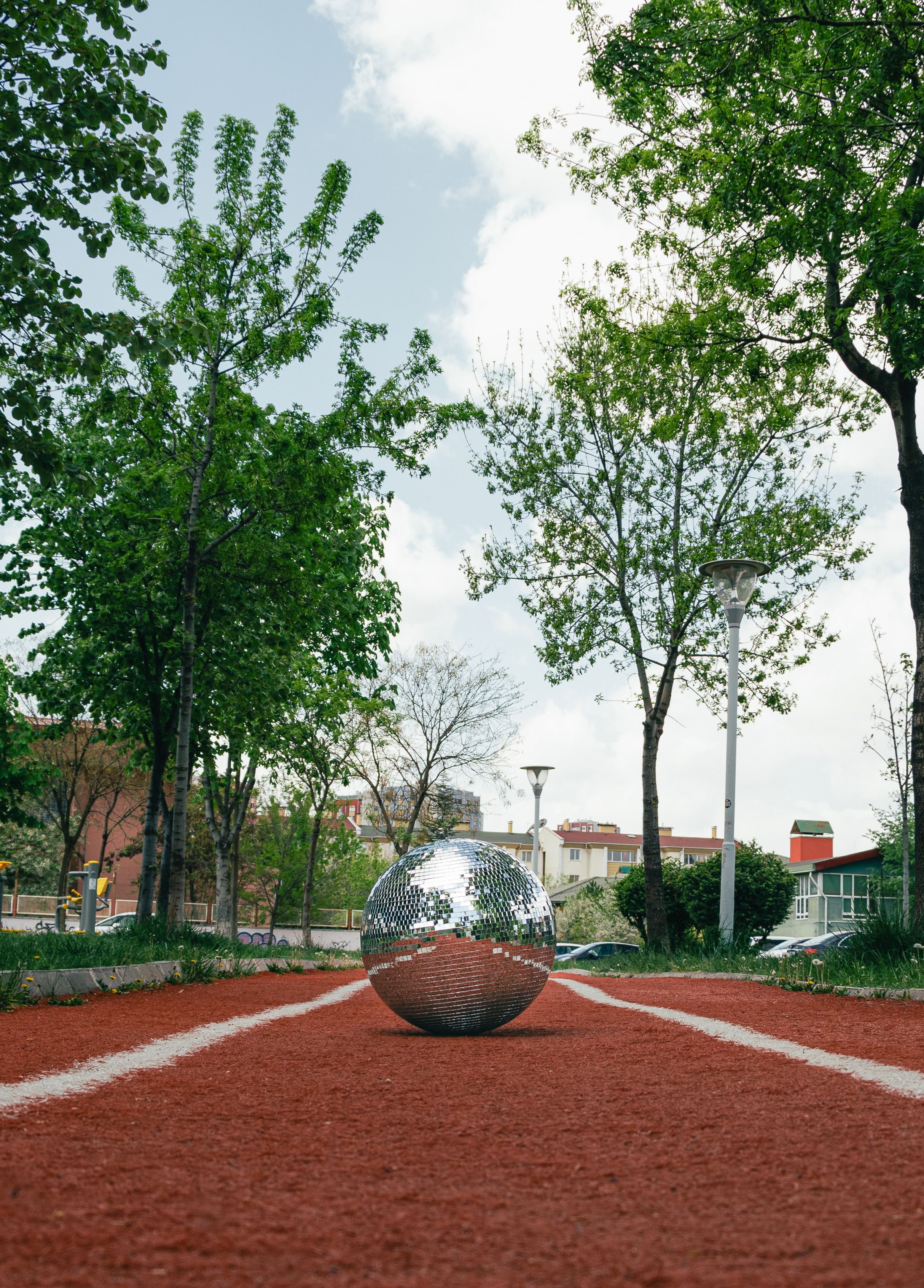 A Disco Ball Lying on the Ground · Free Stock Photo