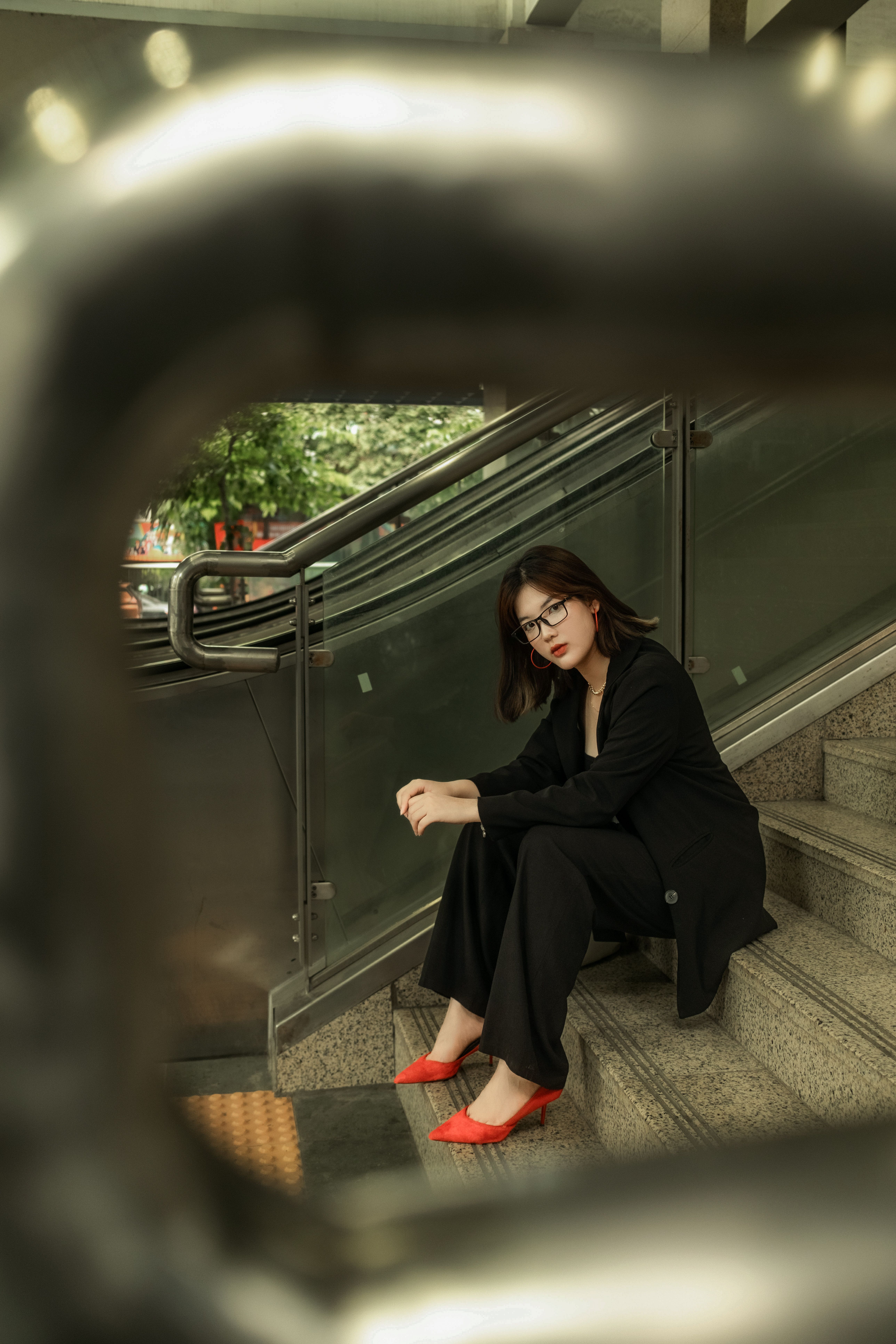 An Elegant Woman Sitting on the Steps · Free Stock Photo