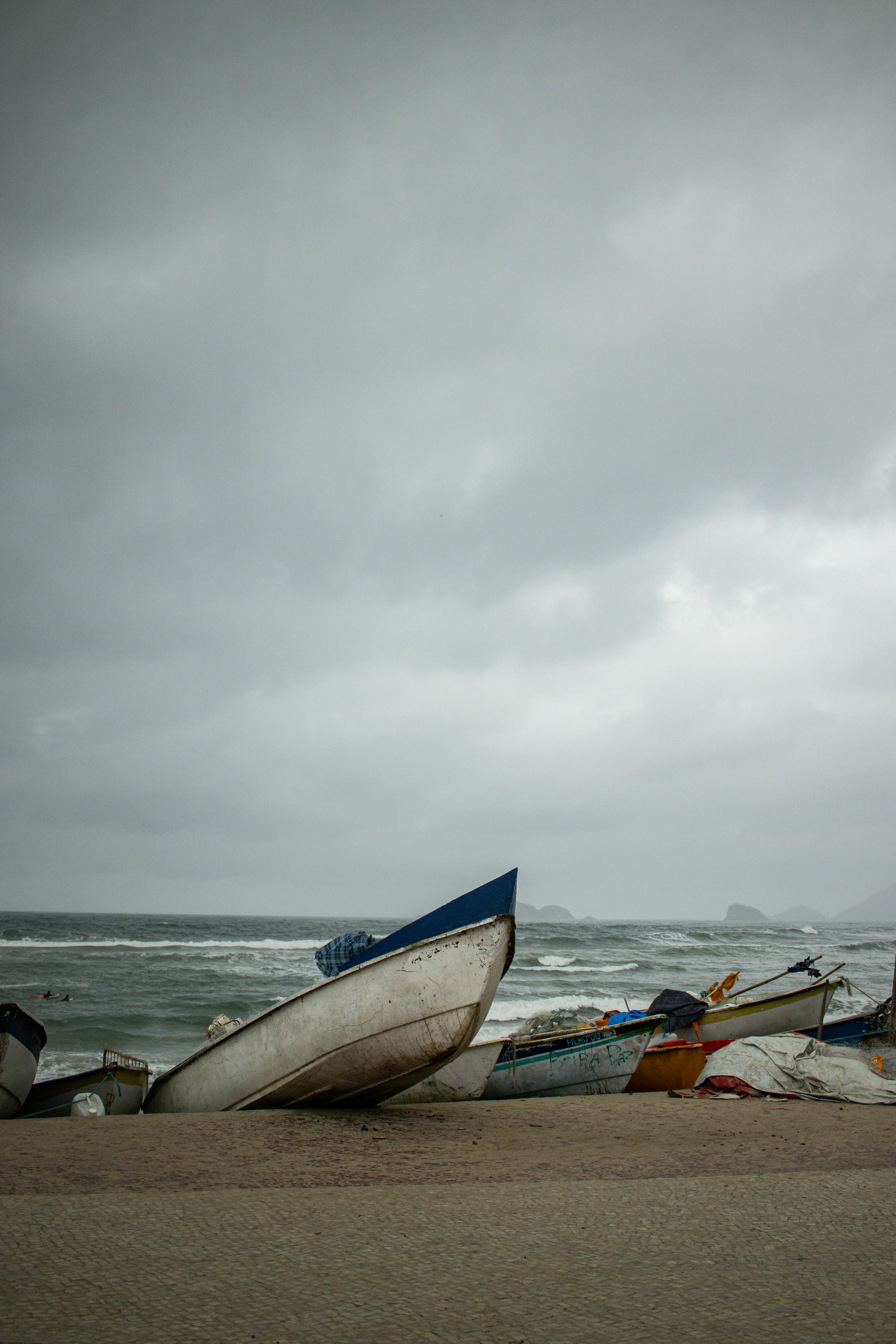 Brown Wooden Boat on Shore during Sunset · Free Stock Photo