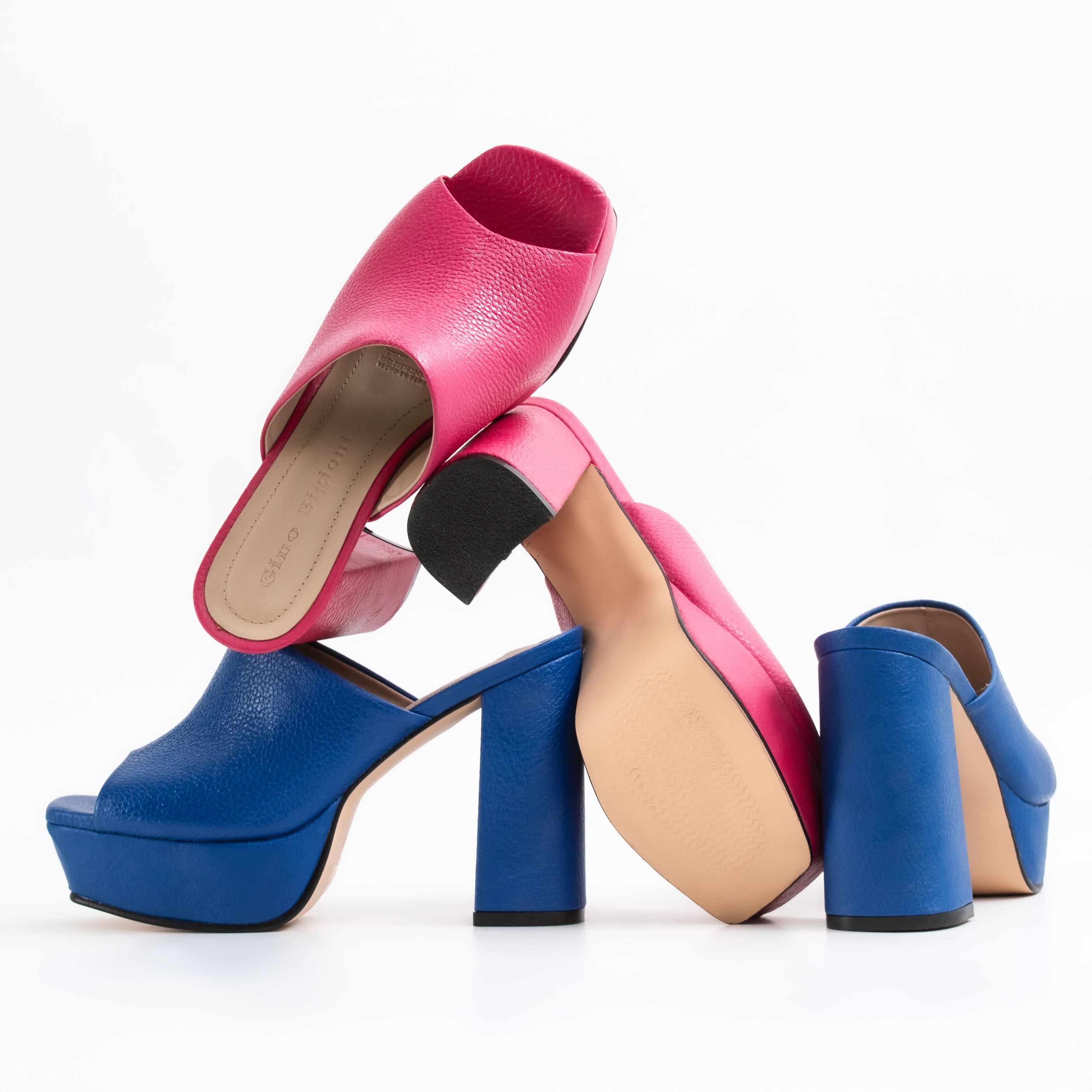Pink and Blue Shoes on a White Background · Free Stock Photo