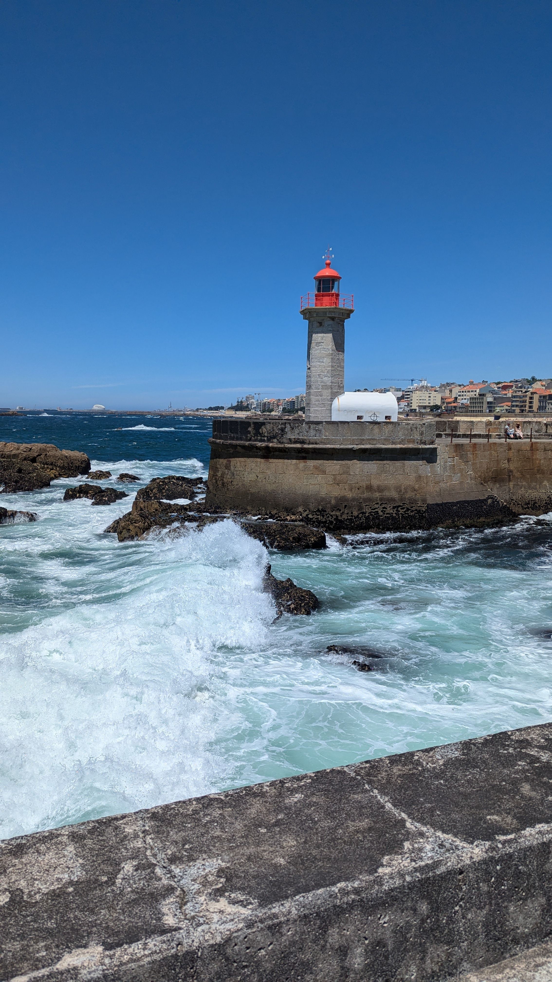 Wave on Seashore near Lighthouse · Free Stock Photo