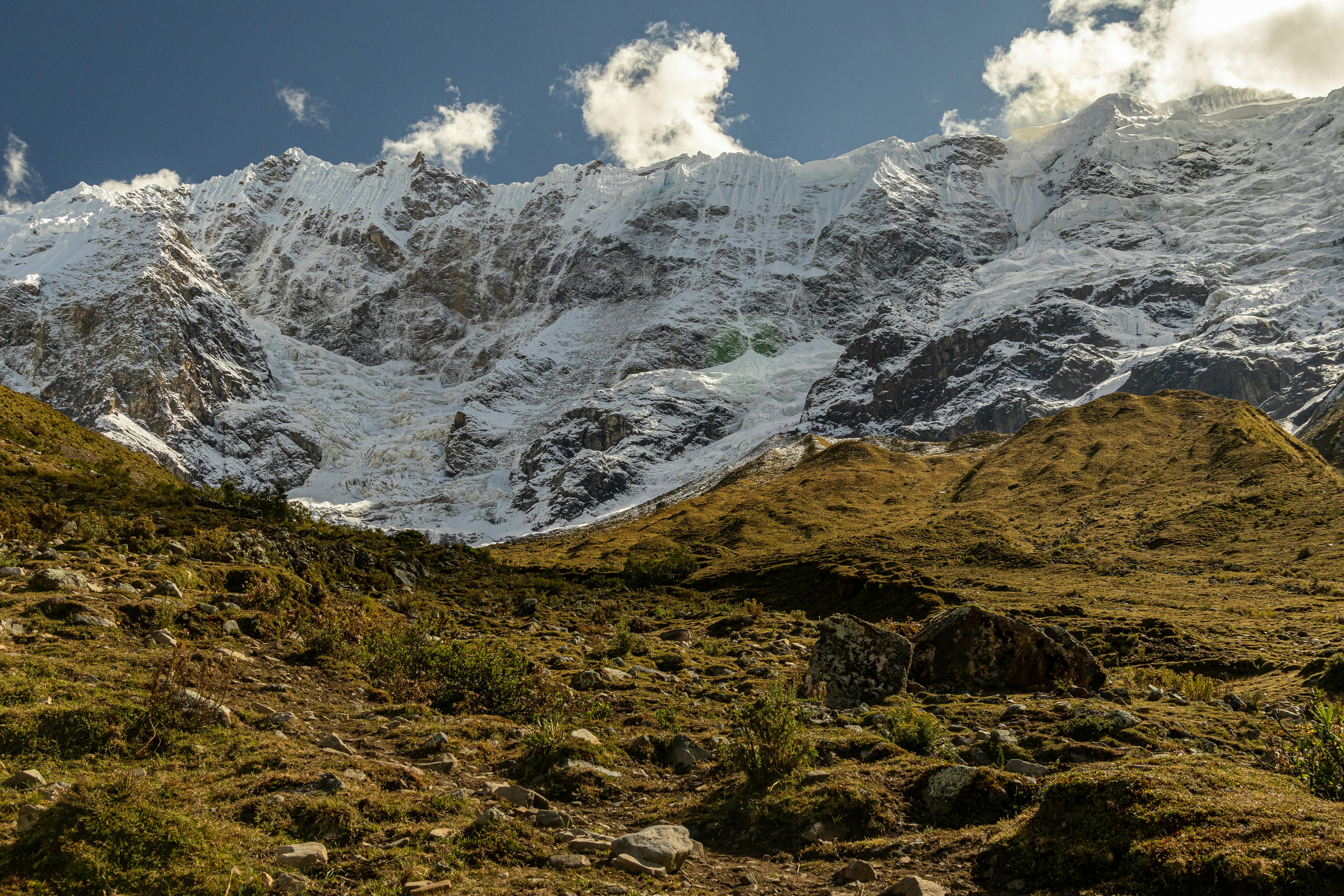 Wide Angle Shot of Snow Covered Mountains · Free Stock Photo