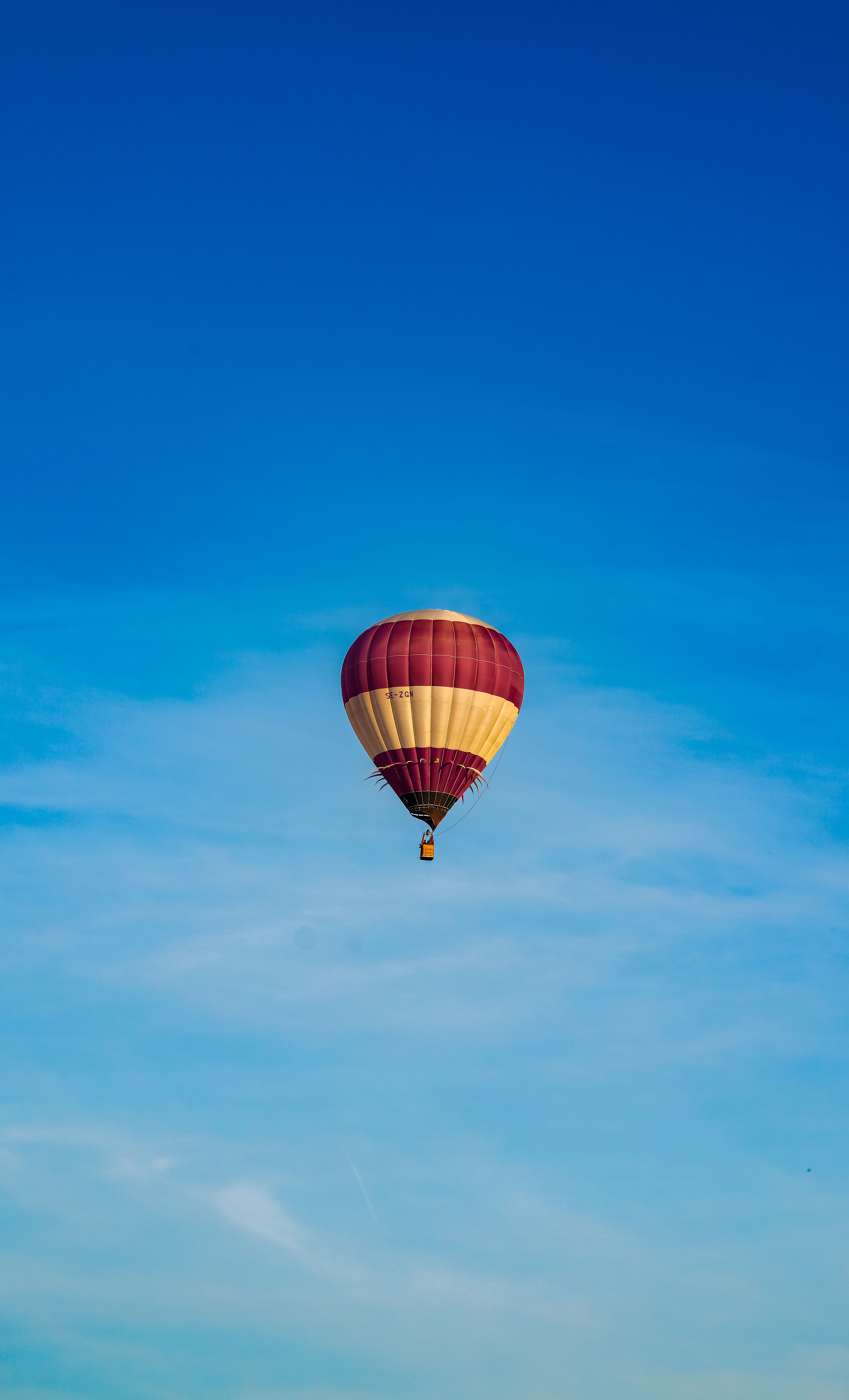 Hot Air Balloon Against a Blue Sky · Free Stock Photo