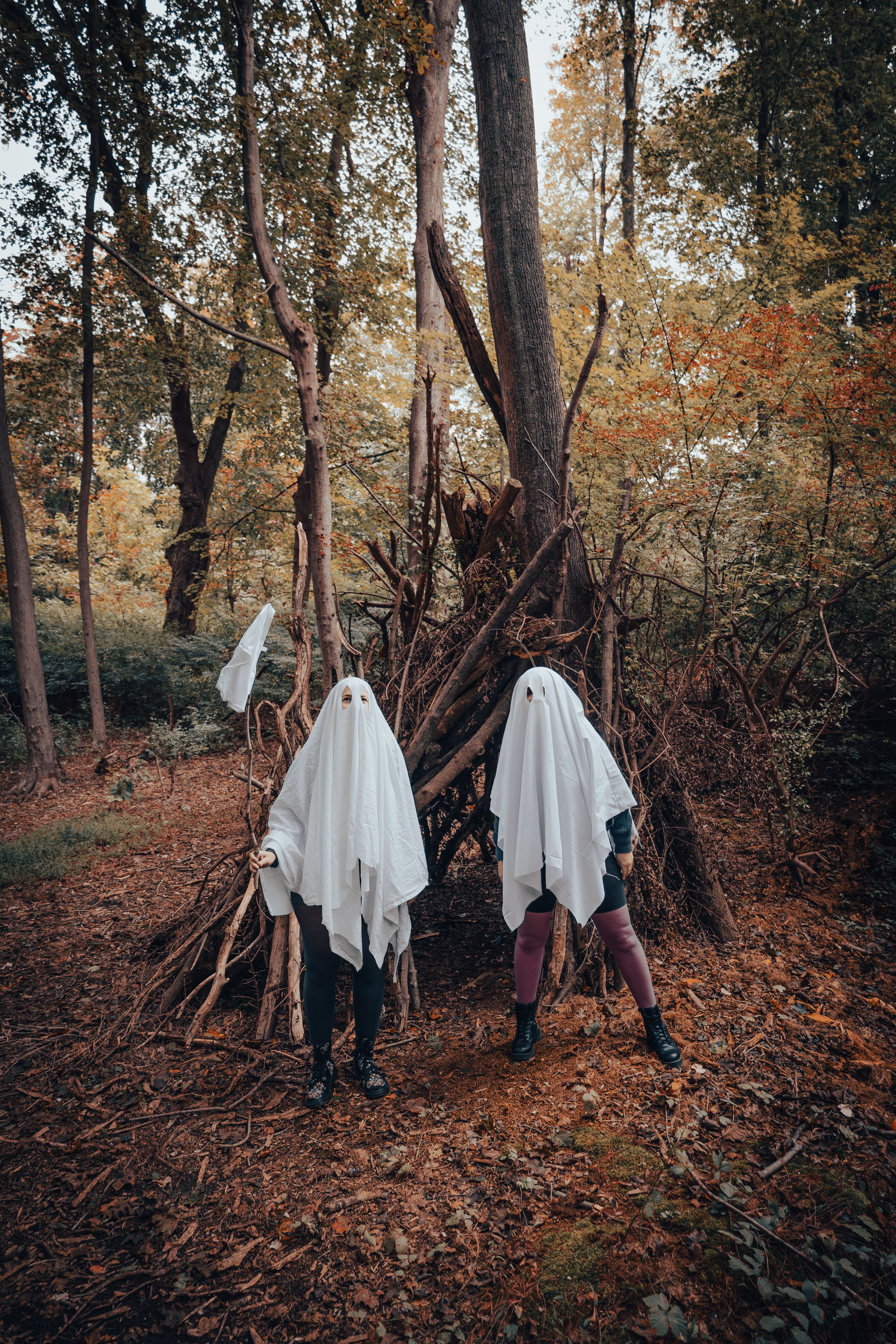 People in Ghosts Costumes in Forest · Free Stock Photo