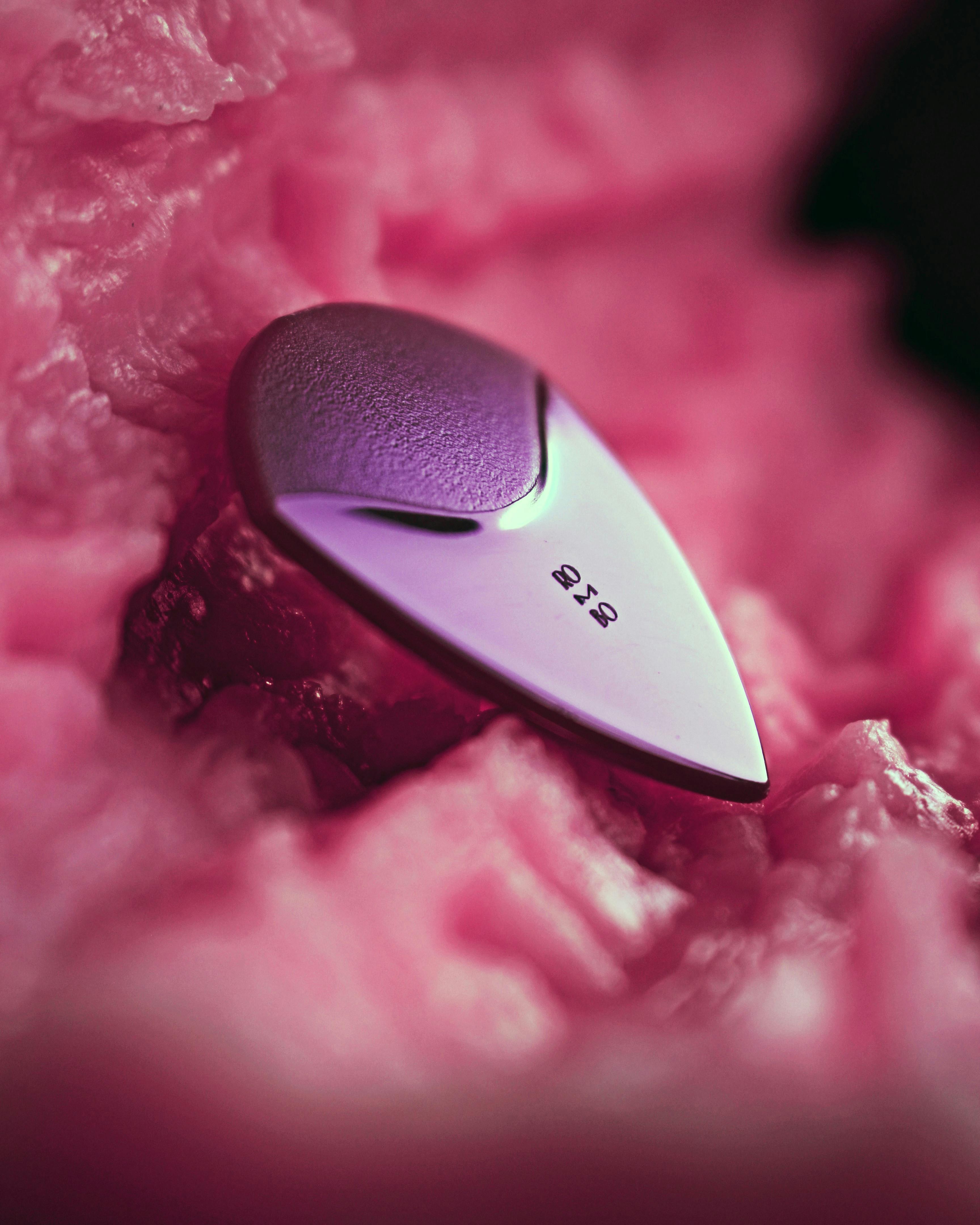 Guitar Pick on Pink Foam · Free Stock Photo