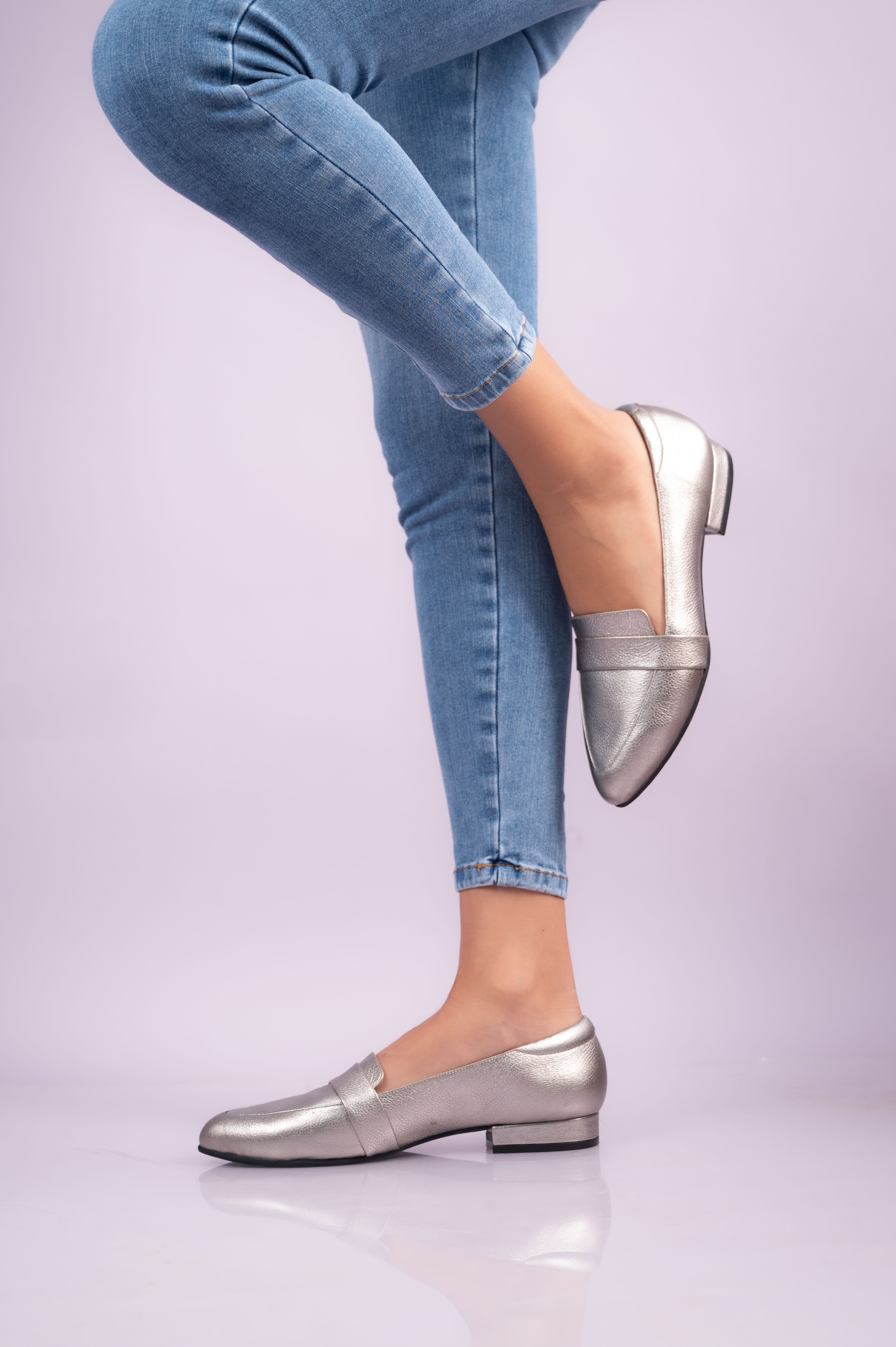 Woman Posing Wearing Jeans and Silver Pumps · Free Stock Photo