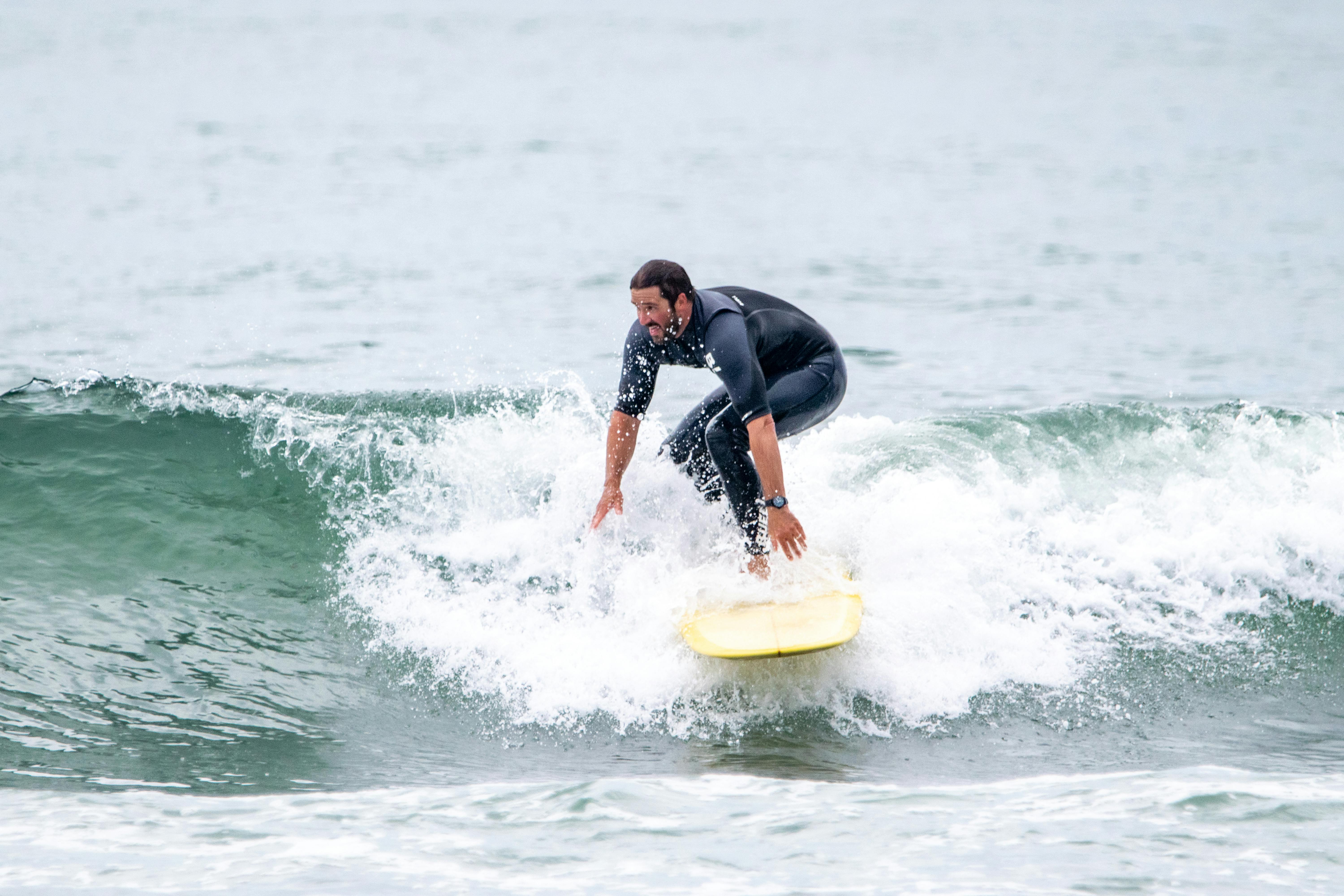 Man Surfing in Sea · Free Stock Photo