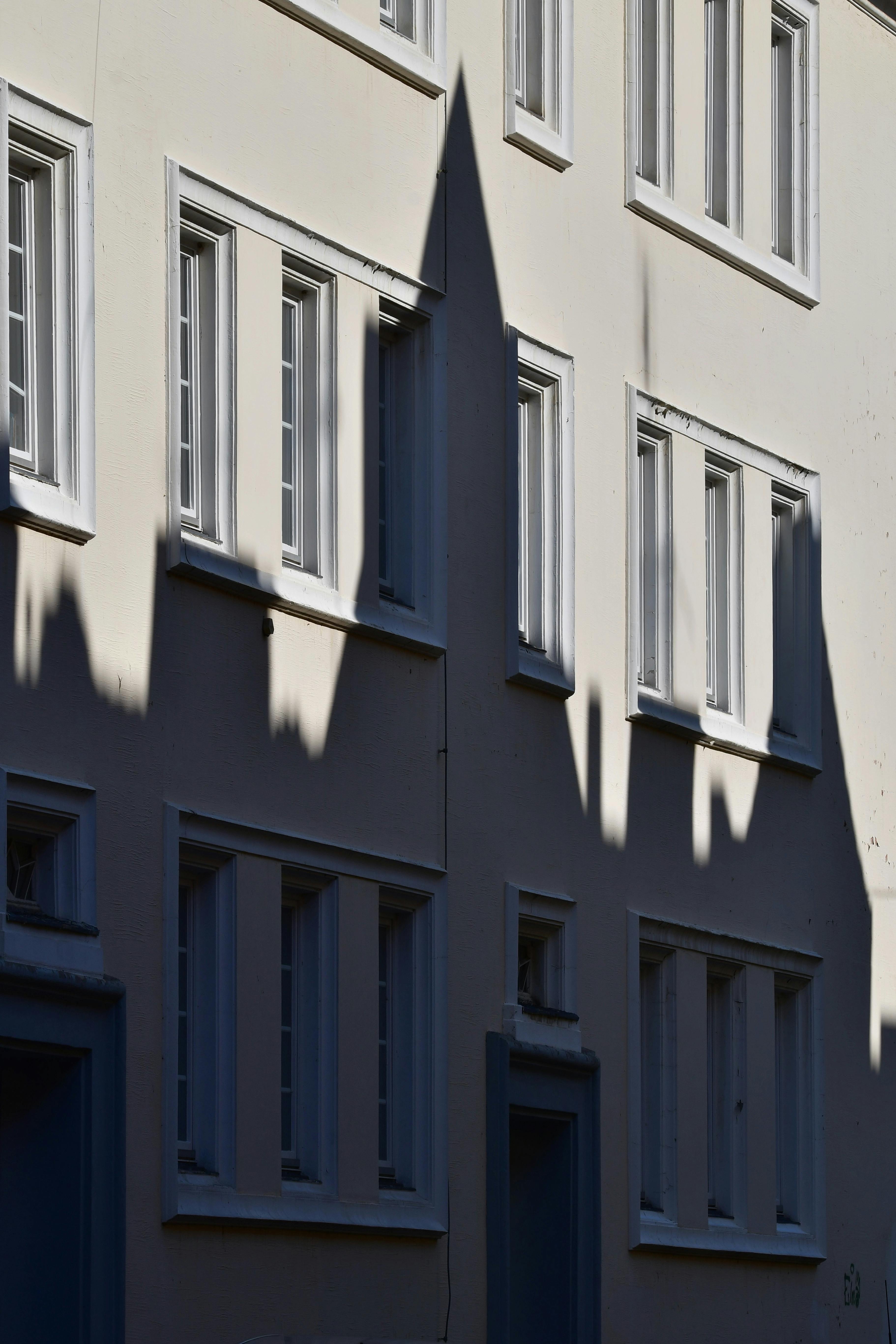 Church Shadow on Building Wall · Free Stock Photo
