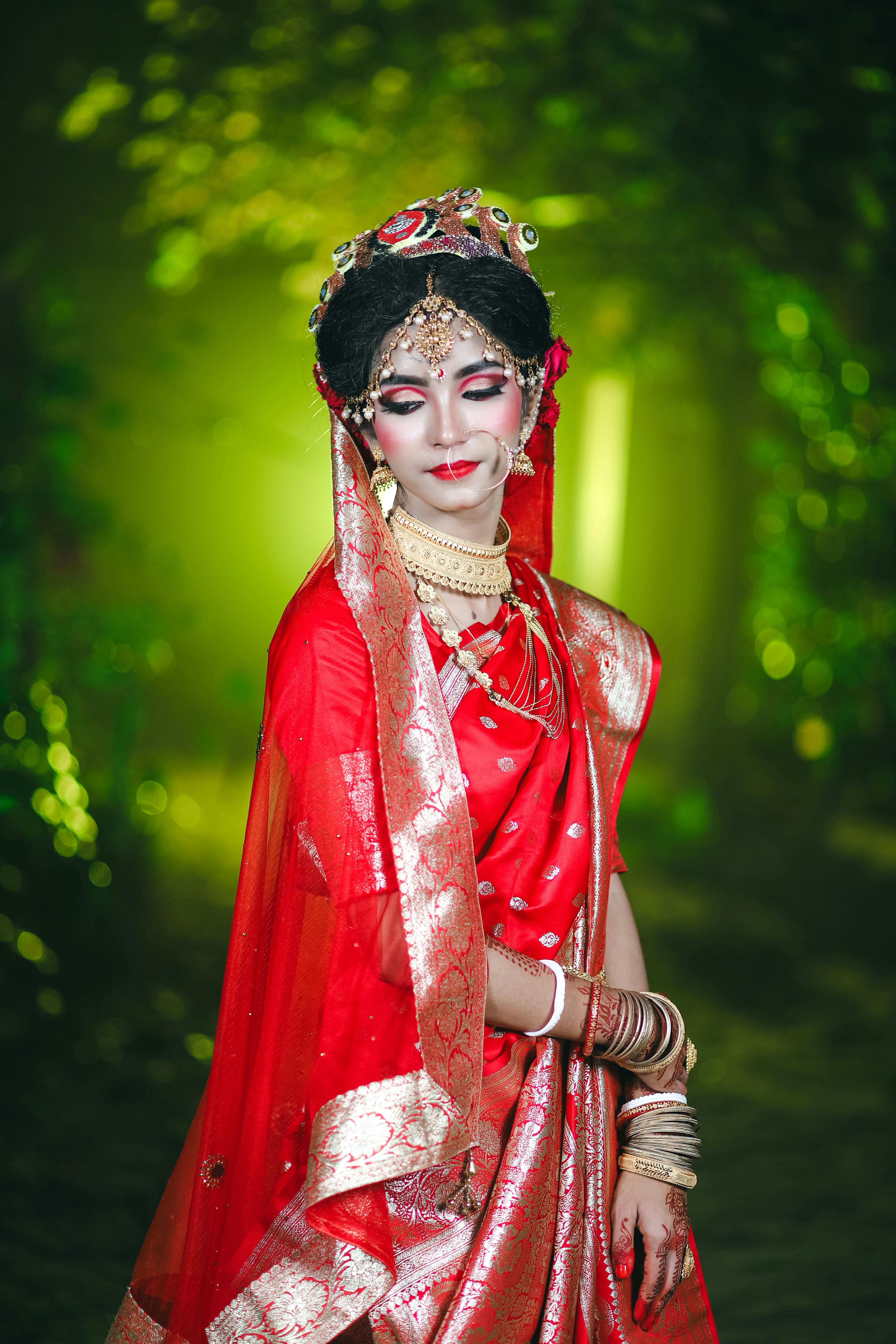 Bride in Red Sari Dress and Veil · Free Stock Photo
