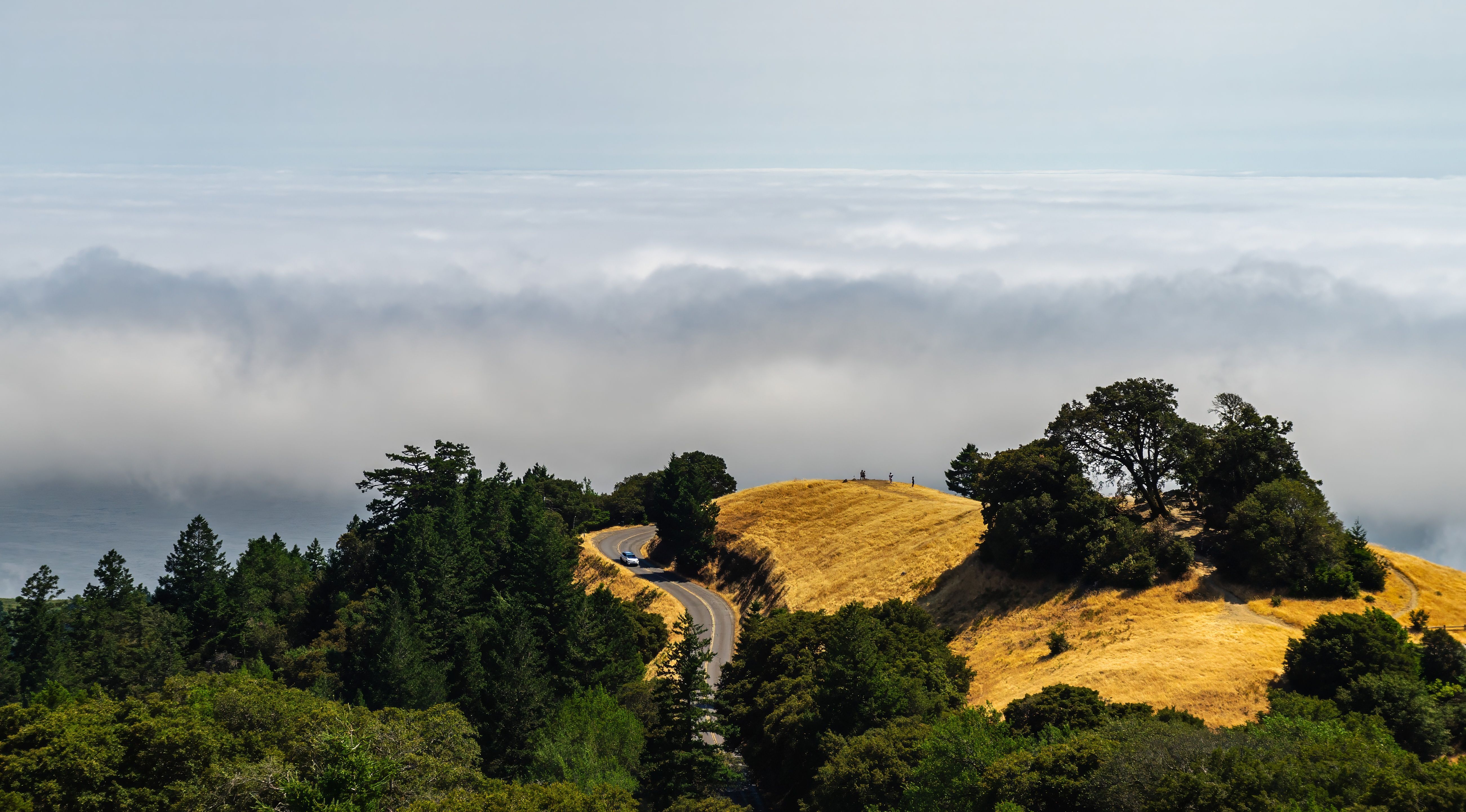 Aerial View of a Road on a Mountain Peak above the Clouds · Free Stock ...