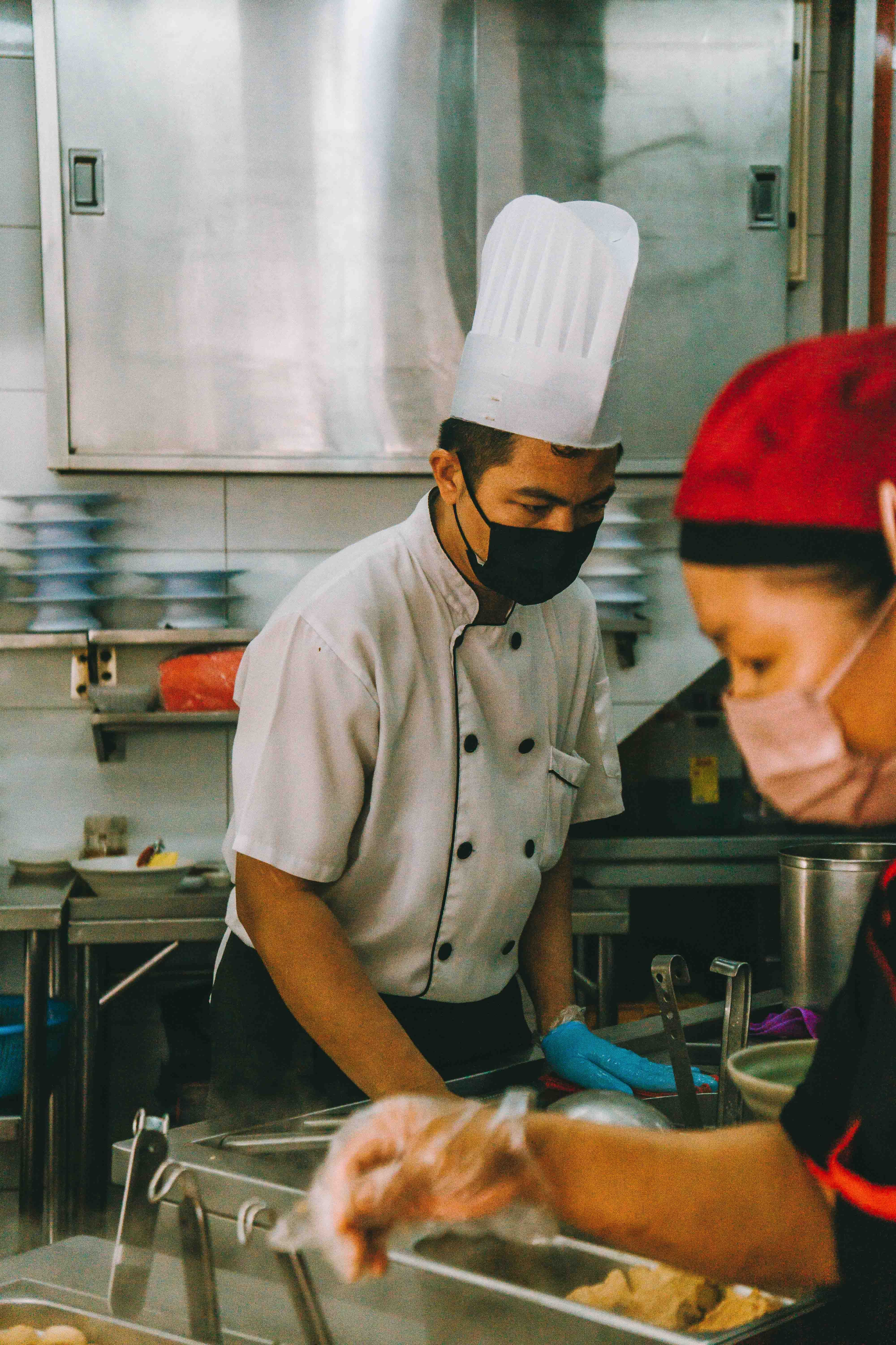 Chef Cooking in Kitchen · Free Stock Photo
