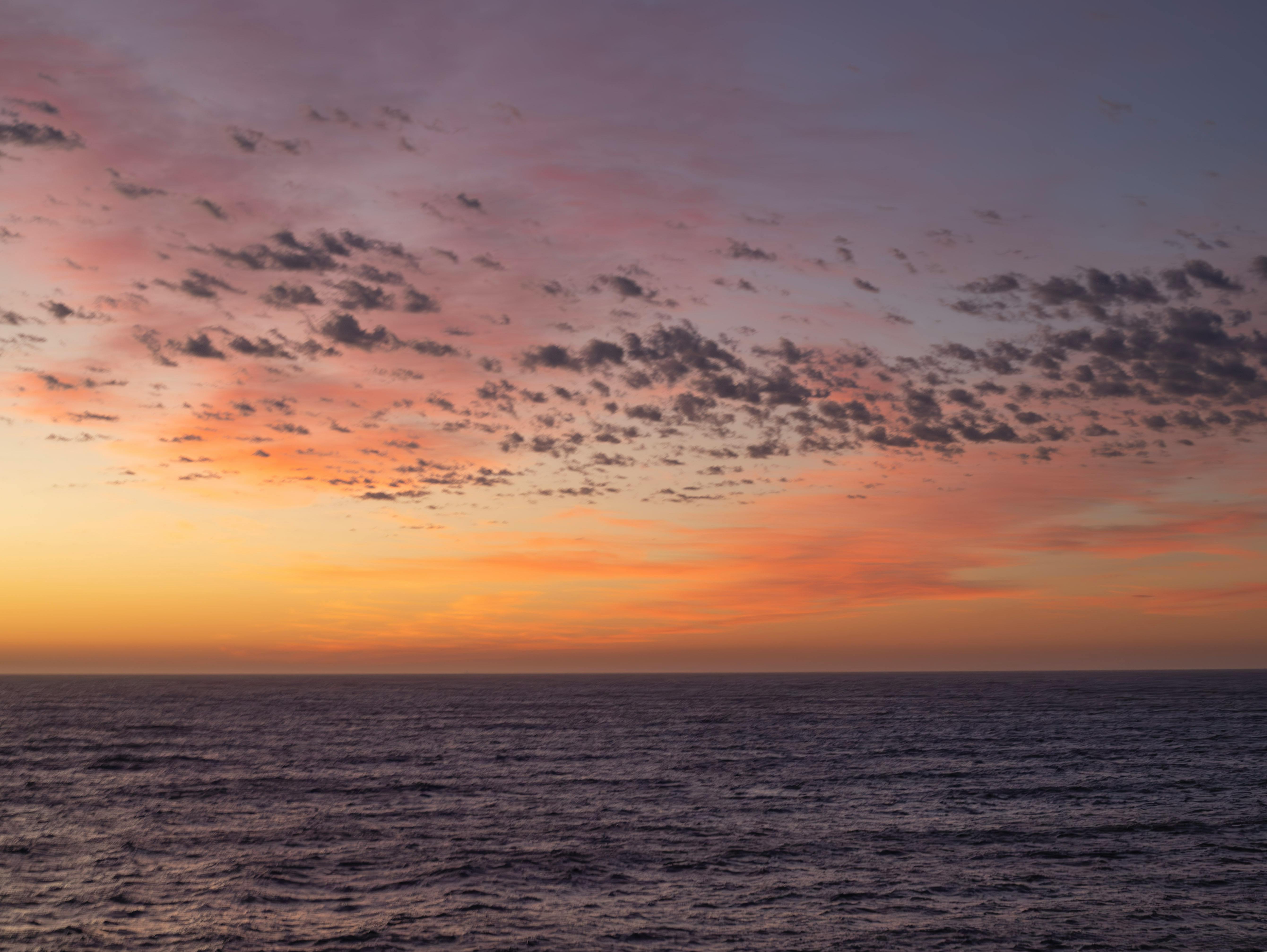 Sunset Over the Ocean · Free Stock Photo