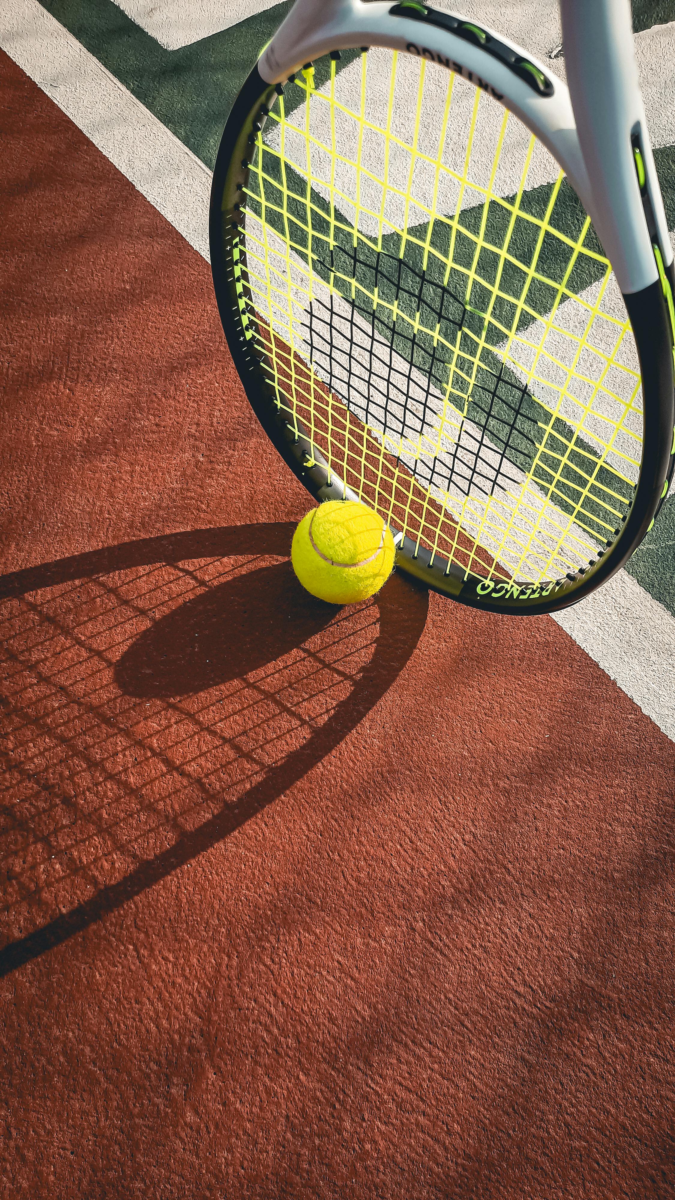 Ball on a Tennis Court · Free Stock Photo