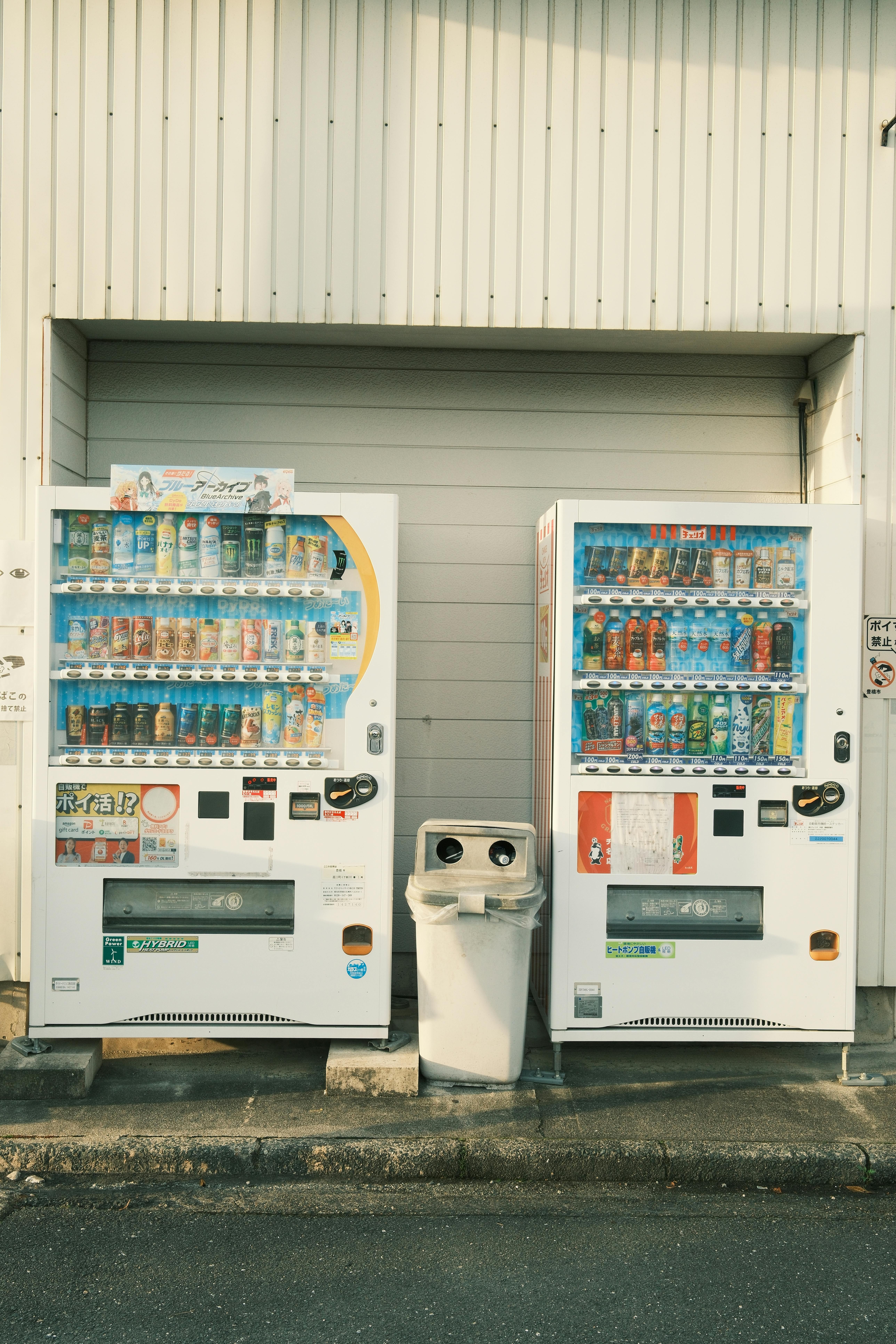 Two vending machines are sitting next to each other · Free Stock Photo
