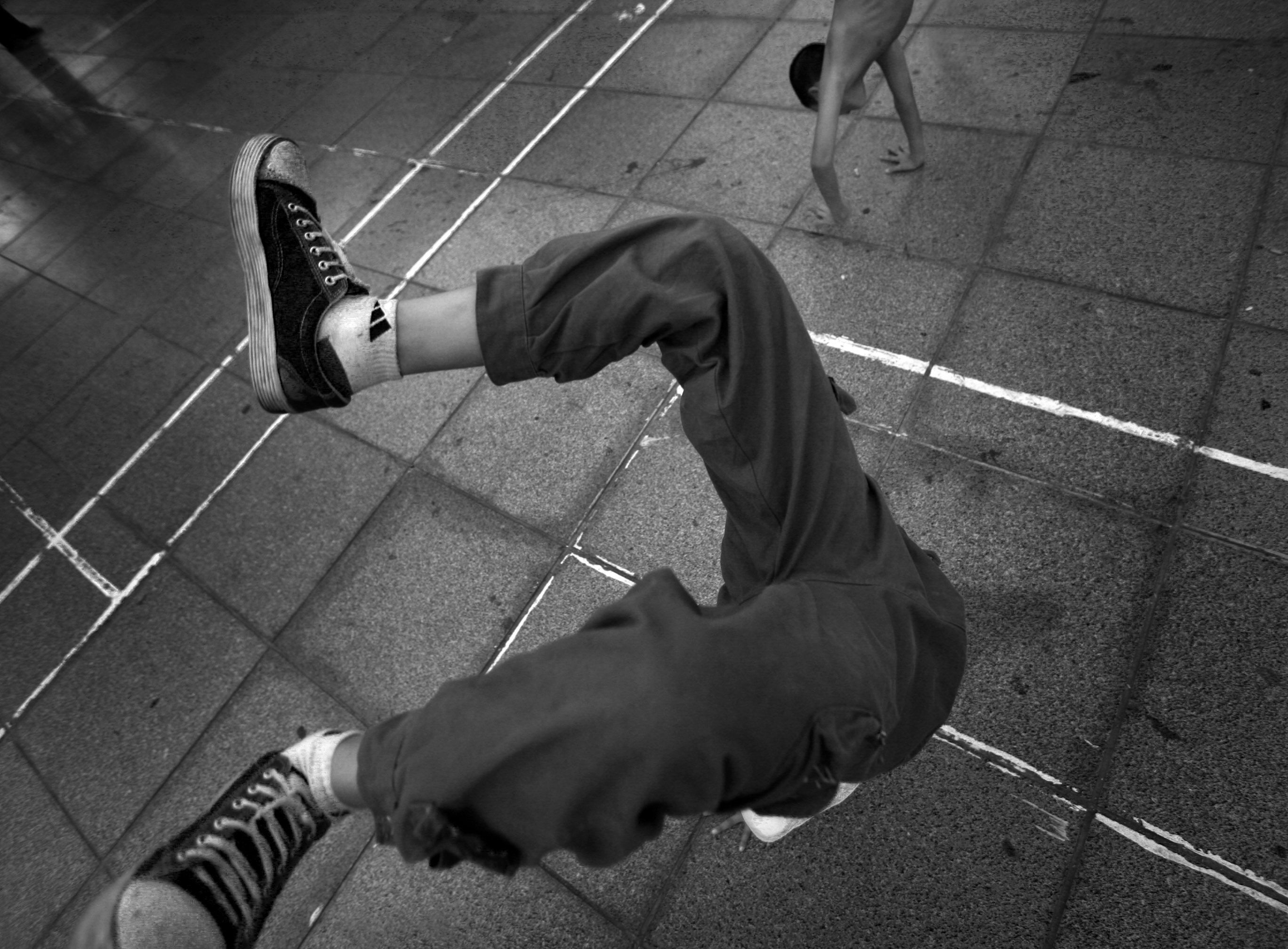 Man Breakdancing in Black and White · Free Stock Photo