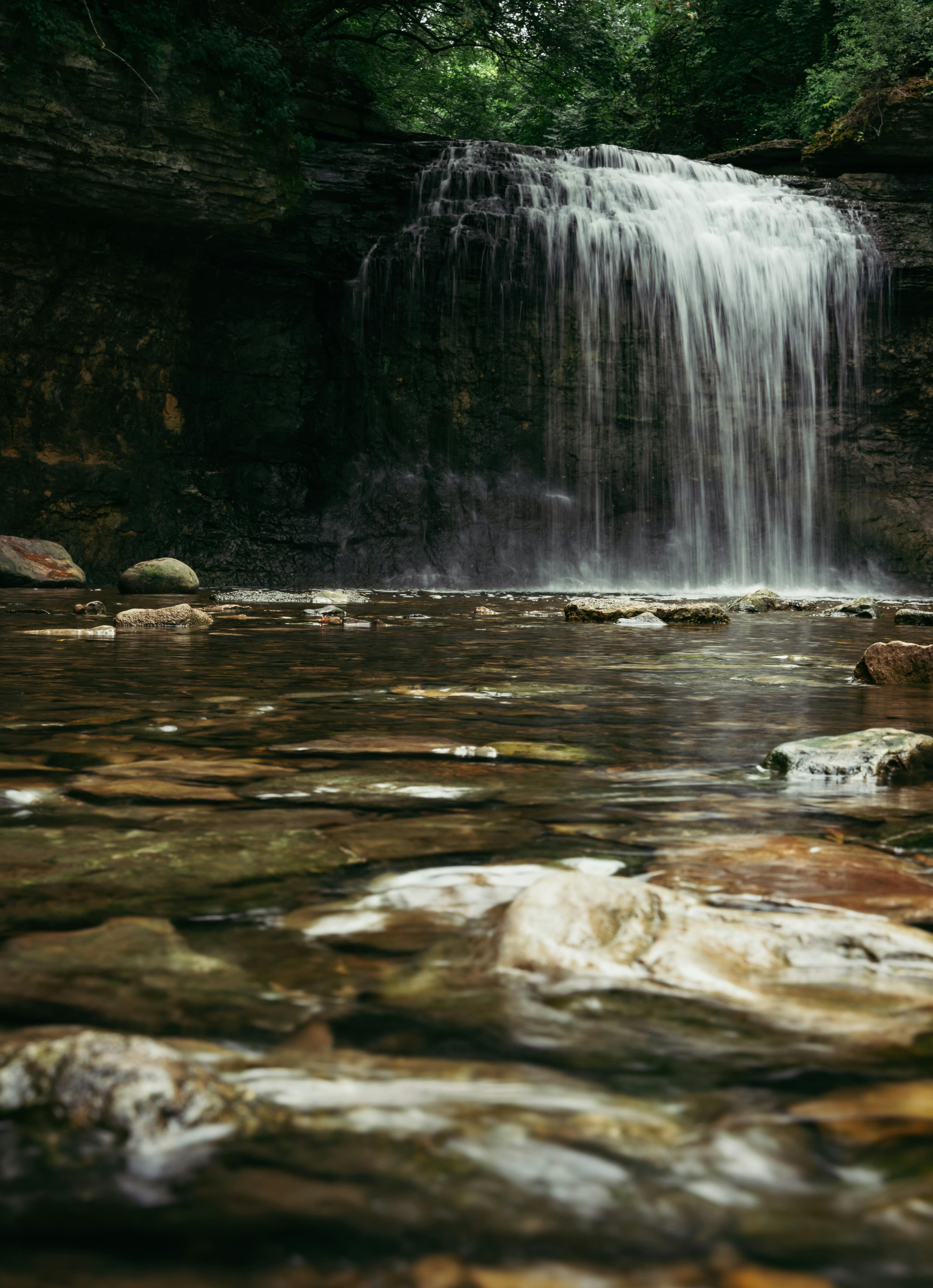 Photography of Waterfalls in Cave · Free Stock Photo