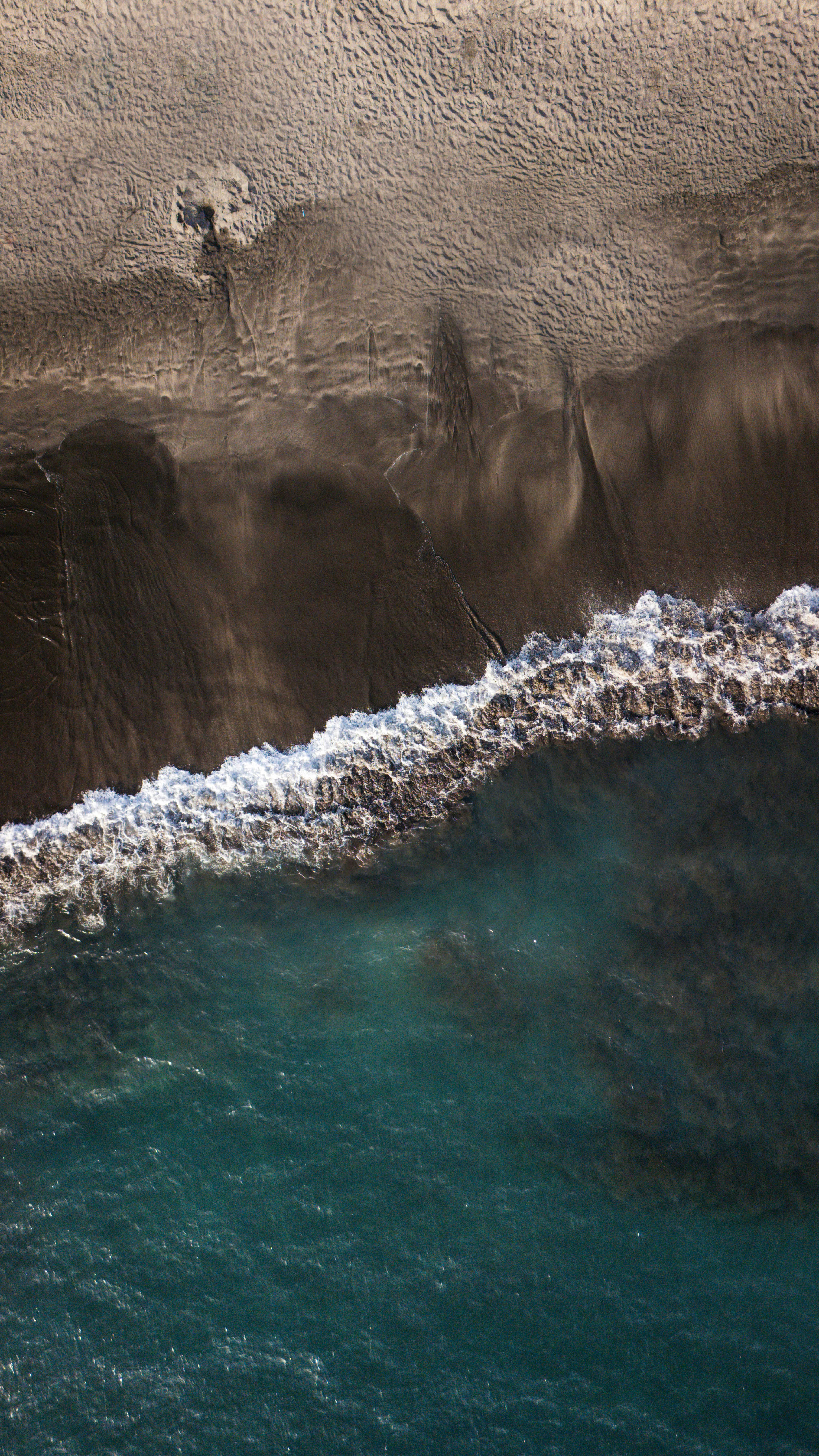 An aerial view of the beach and ocean · Free Stock Photo