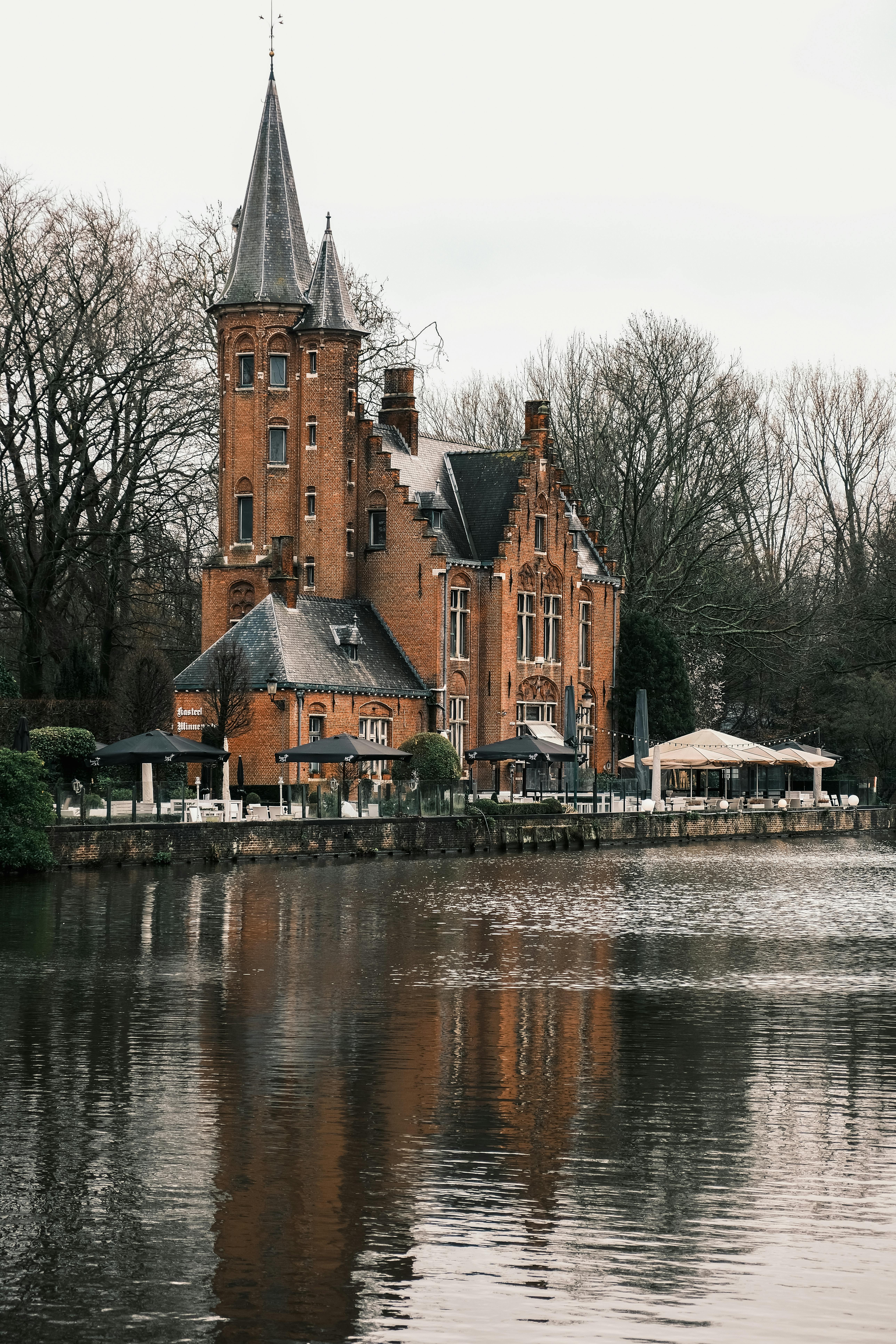Church near River in Bruges · Free Stock Photo