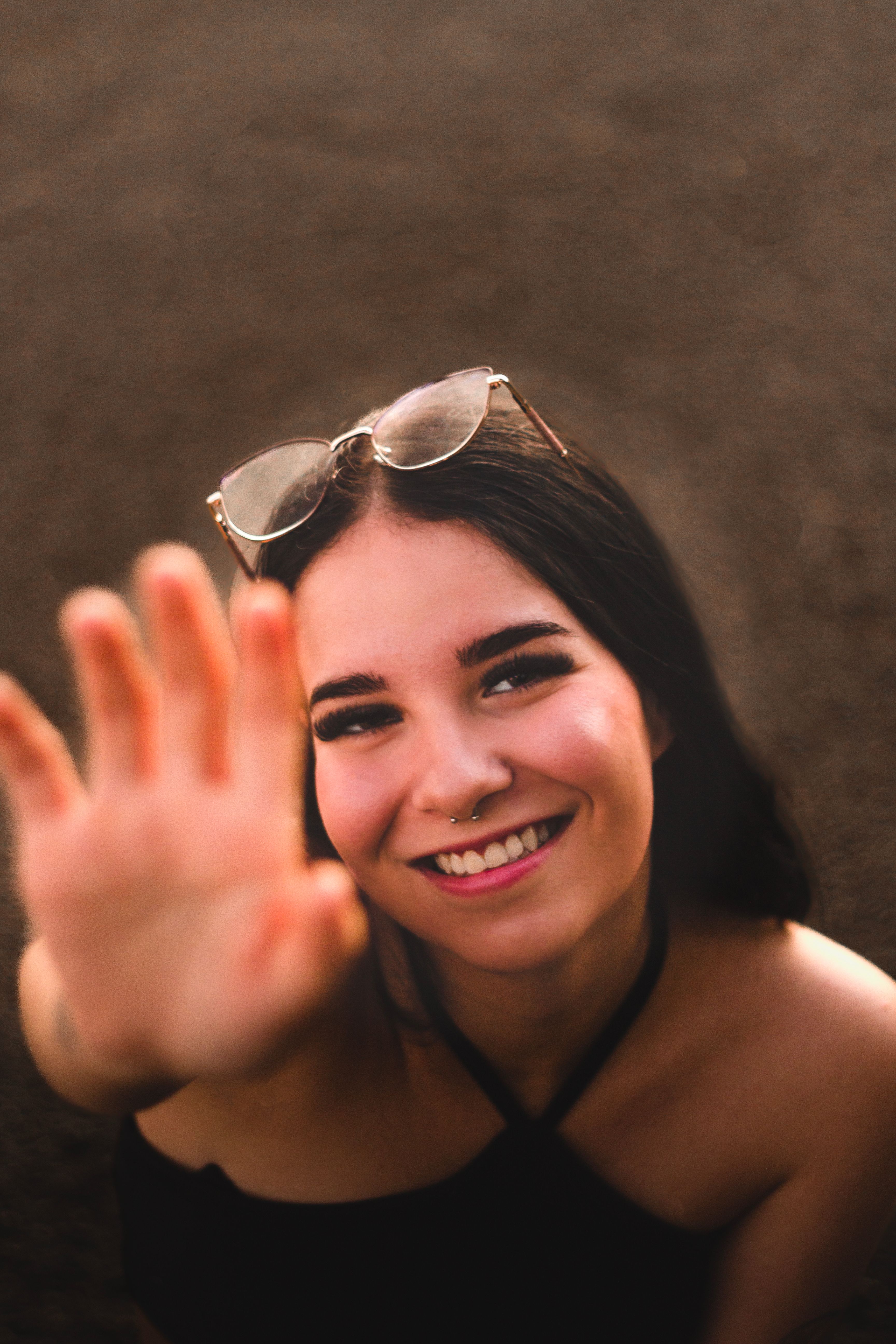 Woman Raising Right Hand · Free Stock Photo