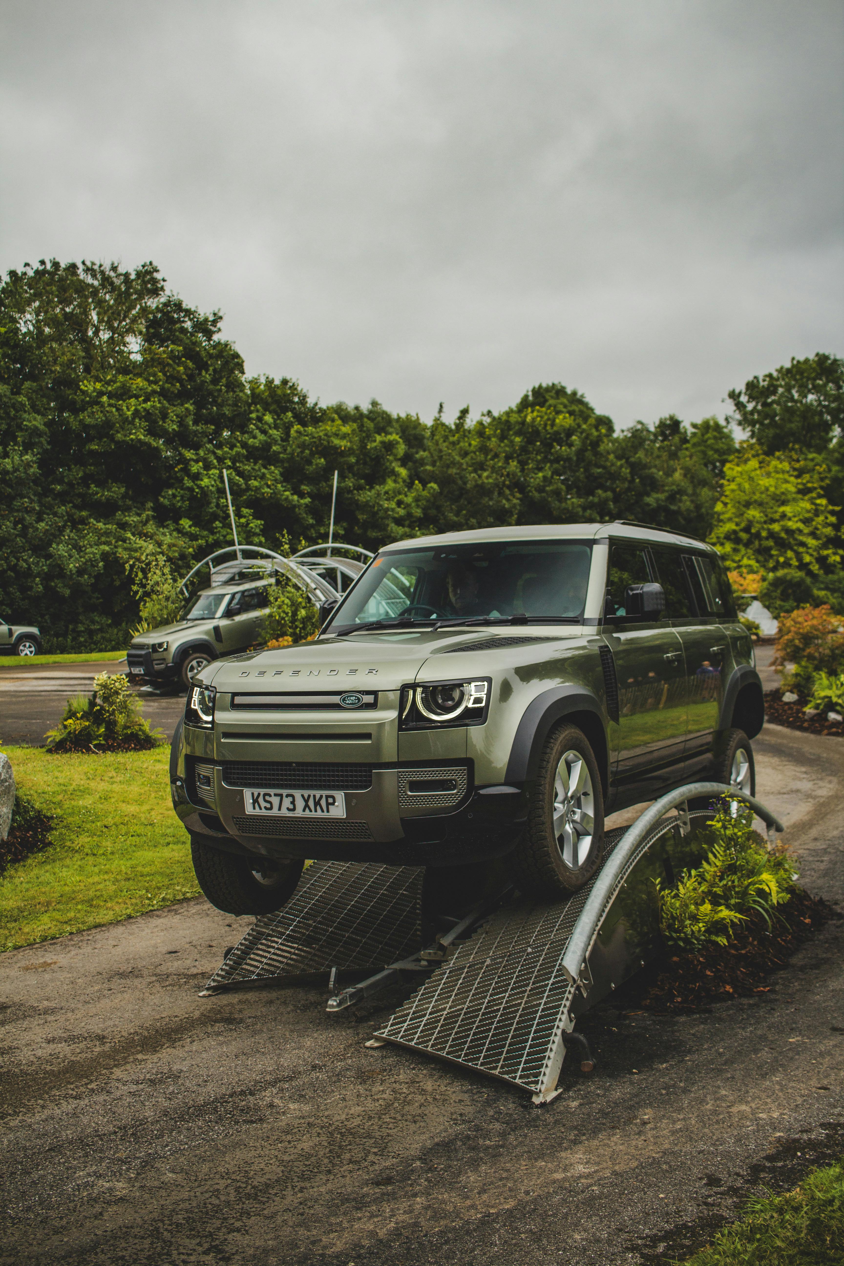 Land rover defender 110 on a ramp · Free Stock Photo