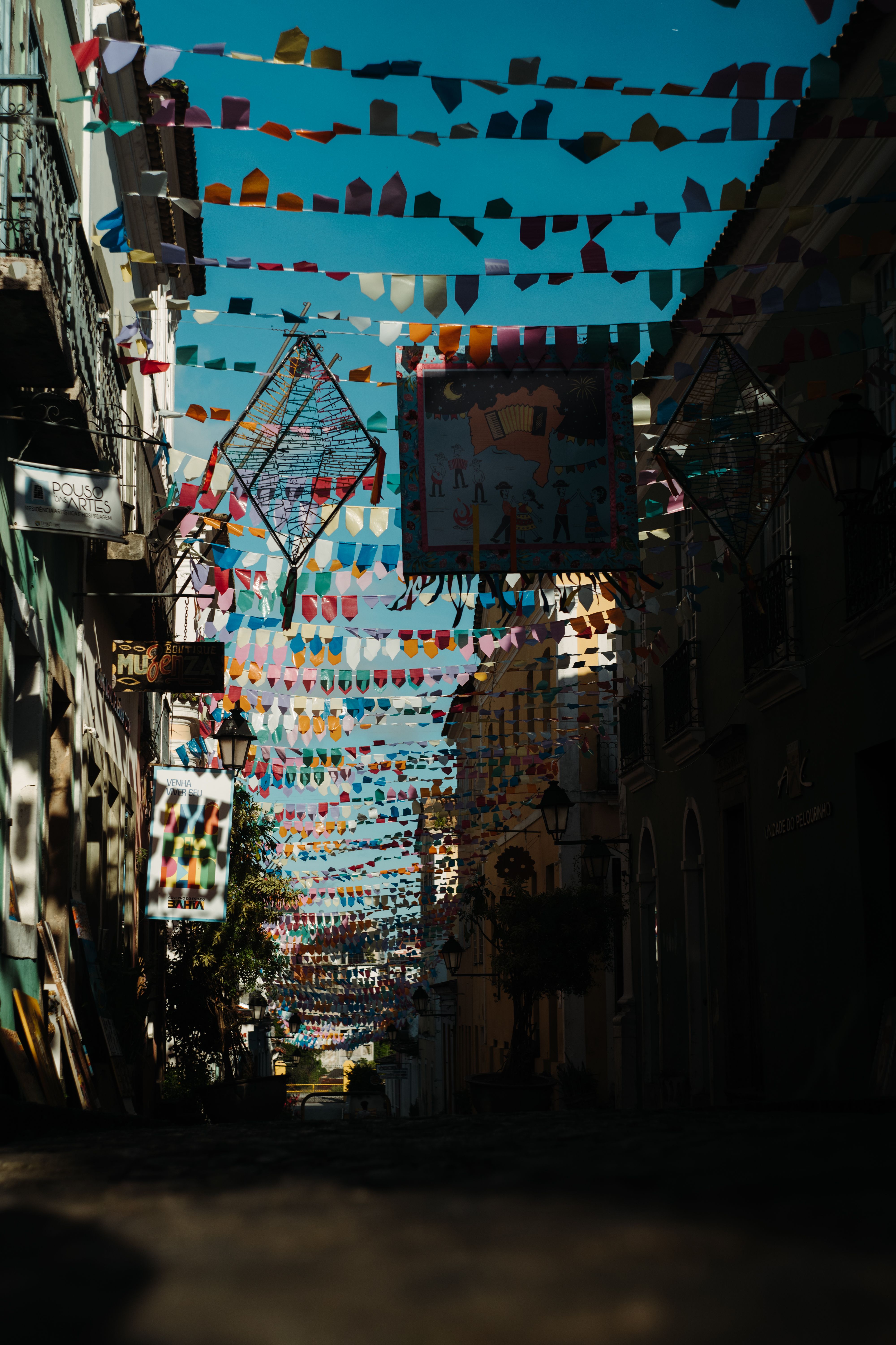 Street in a Town Decorated with Colorful Pennants · Free Stock Photo