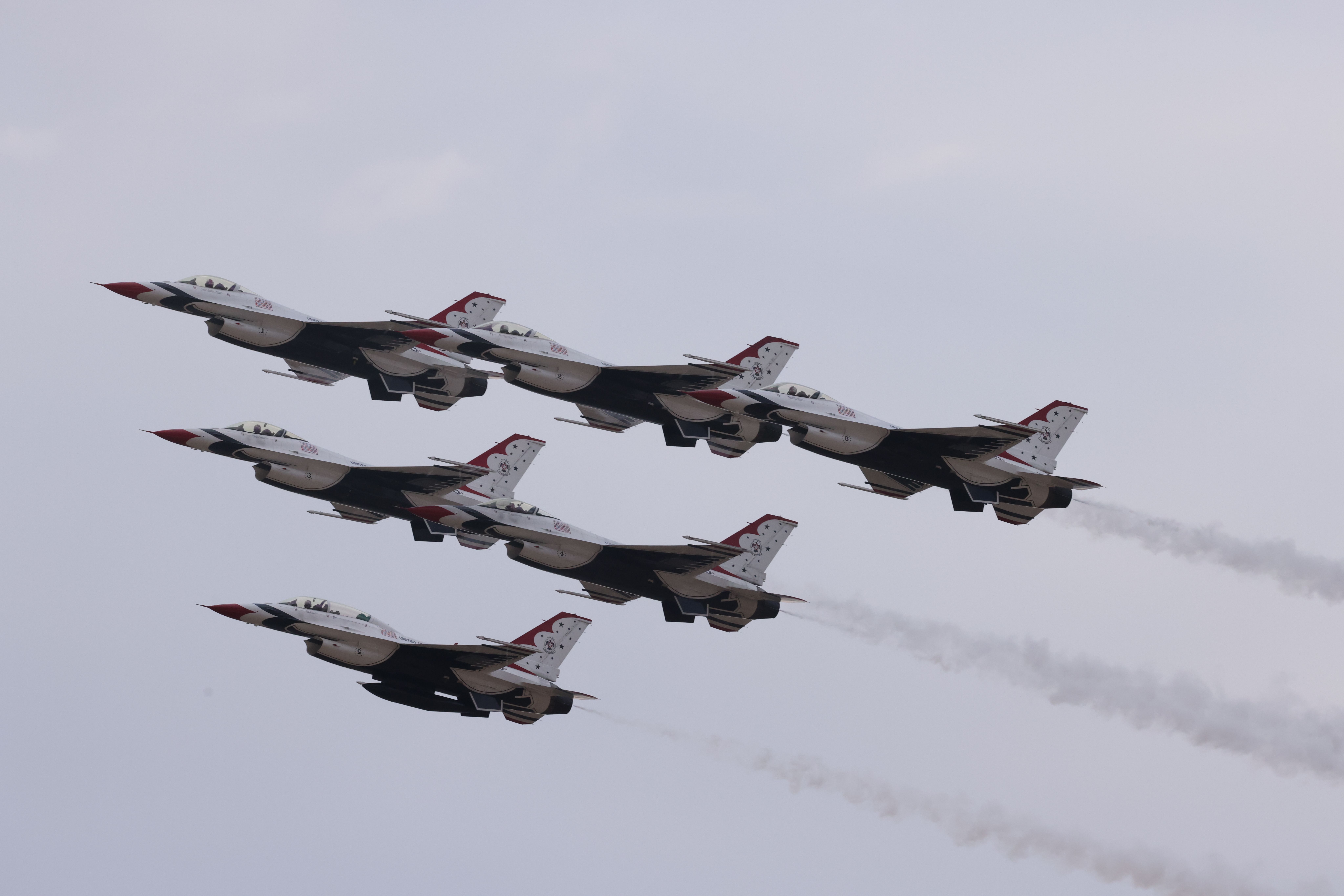 A group of jets flying in formation · Free Stock Photo