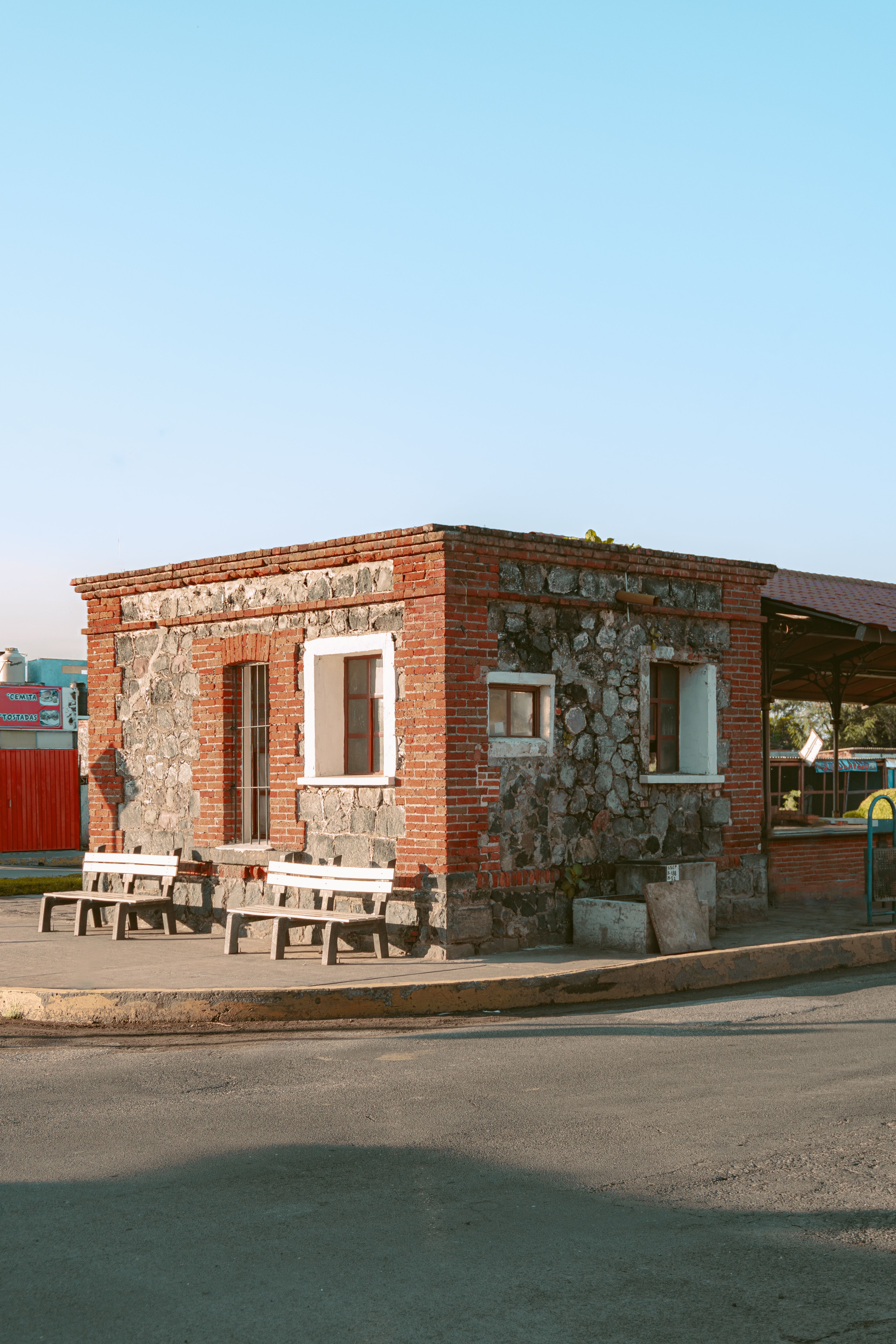 Stone Building on Street Corner · Free Stock Photo