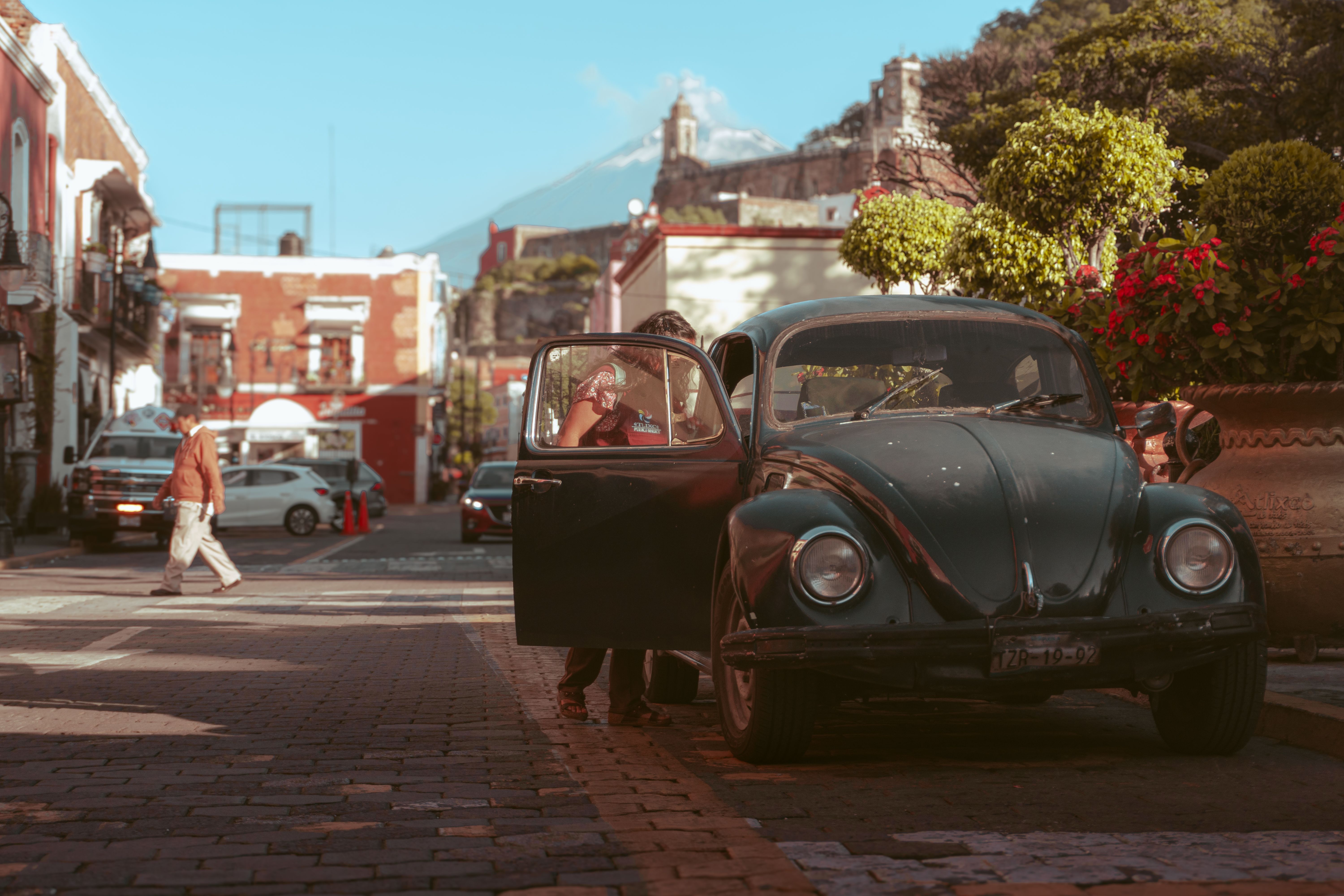 A Vintage Car in a City · Free Stock Photo