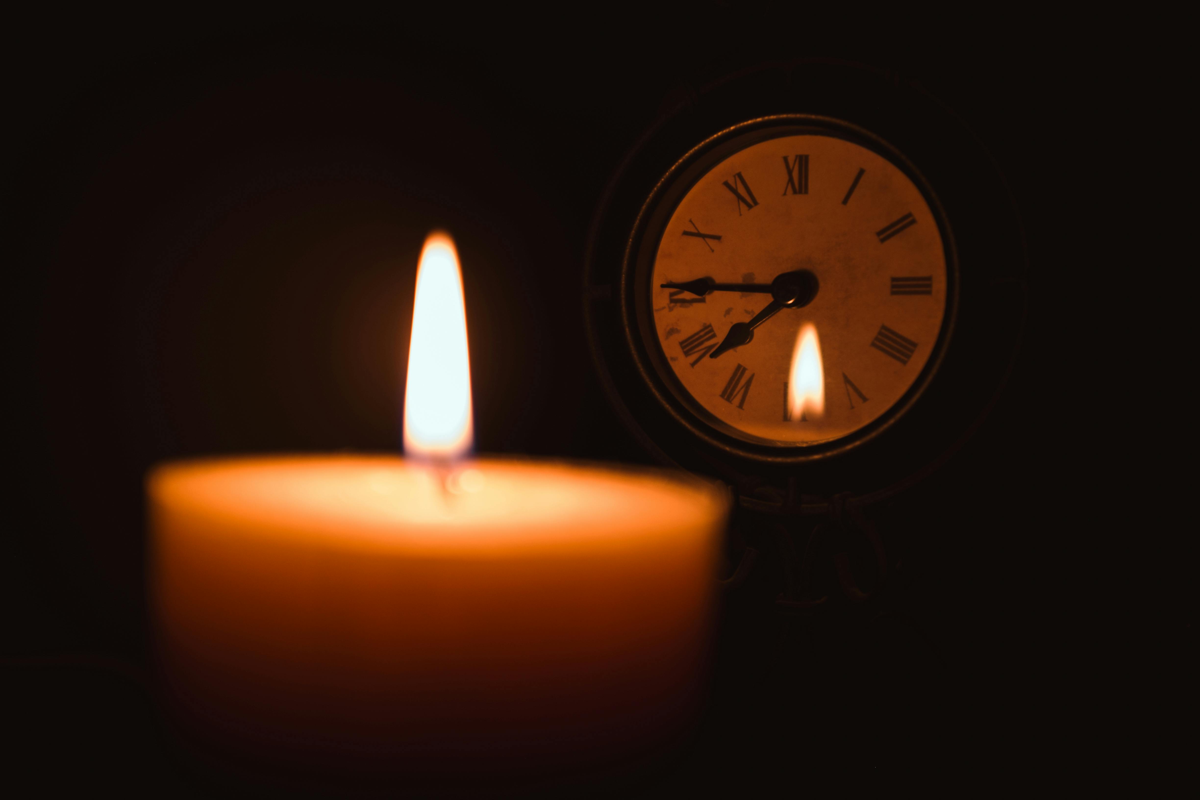 Wax Candle and Clock · Free Stock Photo
