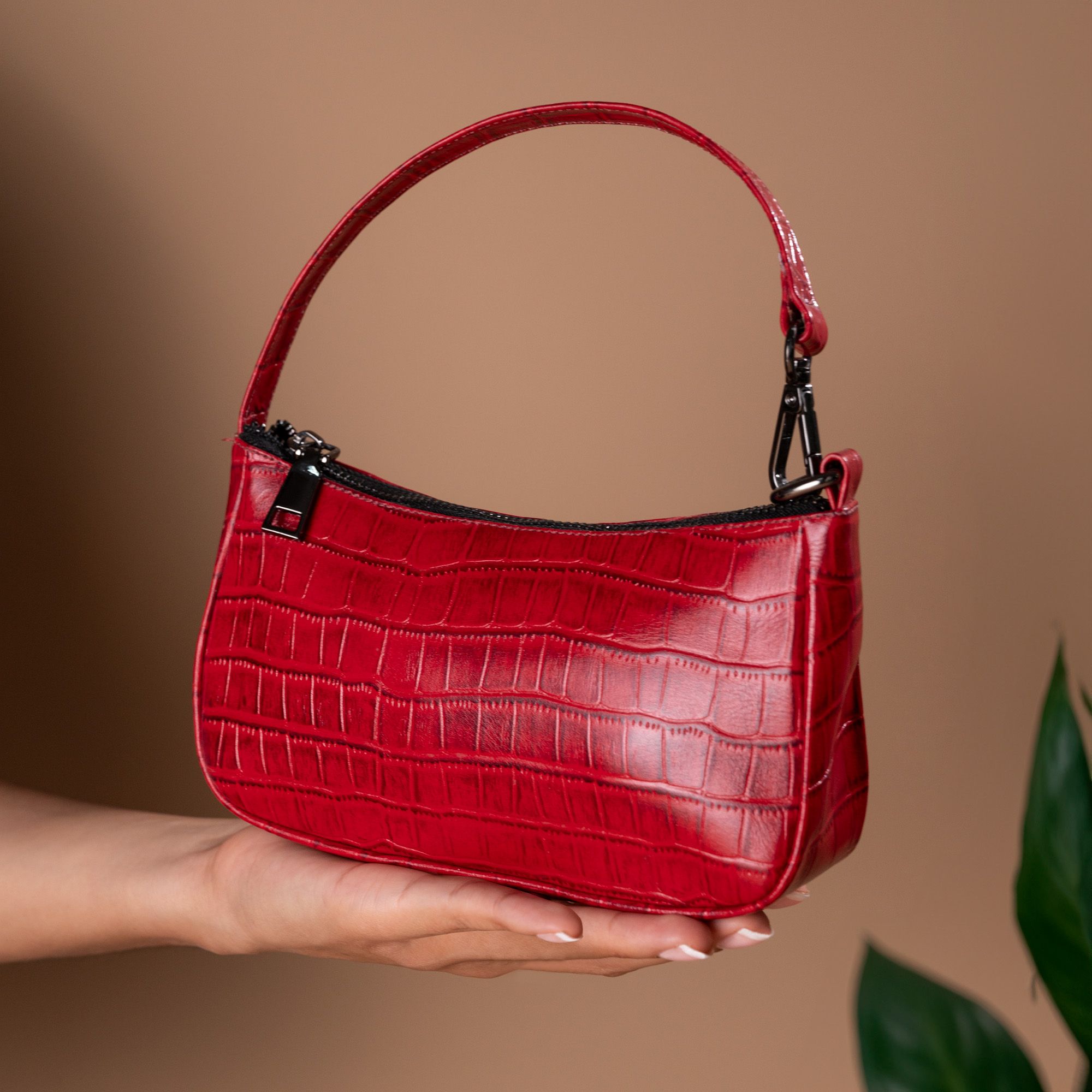 Woman Hand Holding Bags · Free Stock Photo