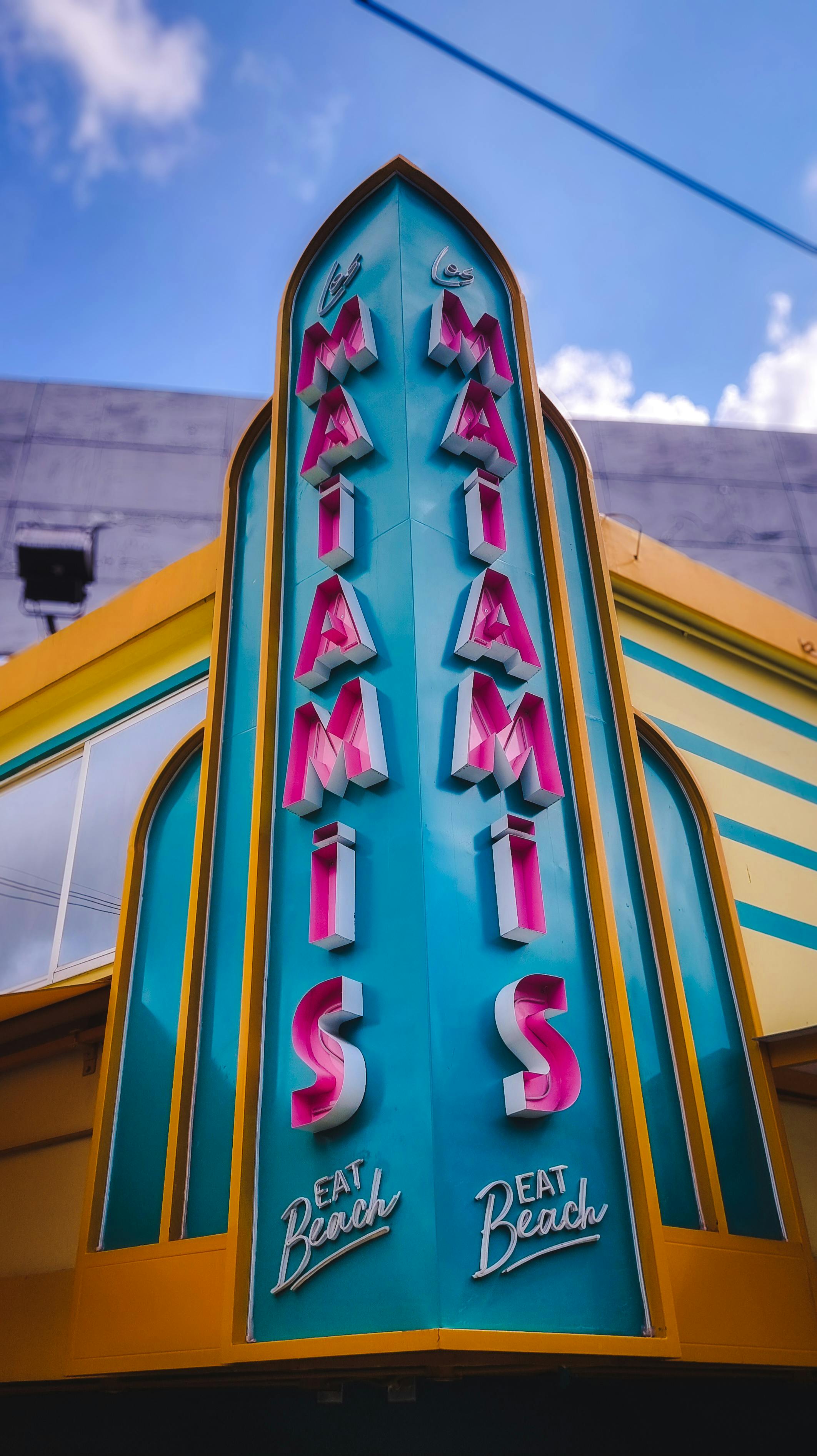 Pink Neon on a Building · Free Stock Photo