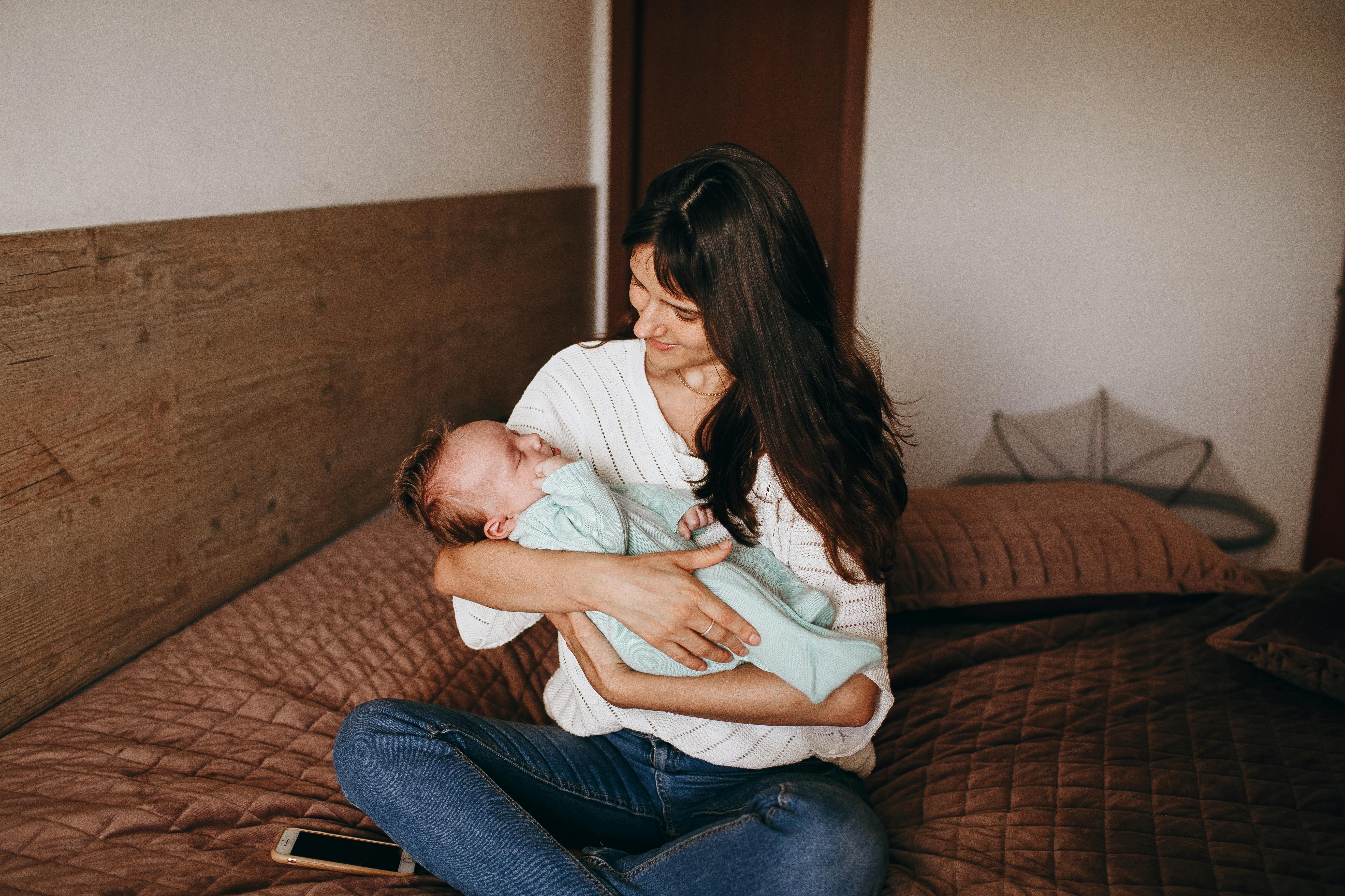 Girl Cradling Baby Photos, Download The BEST Free Girl Cradling Baby ...