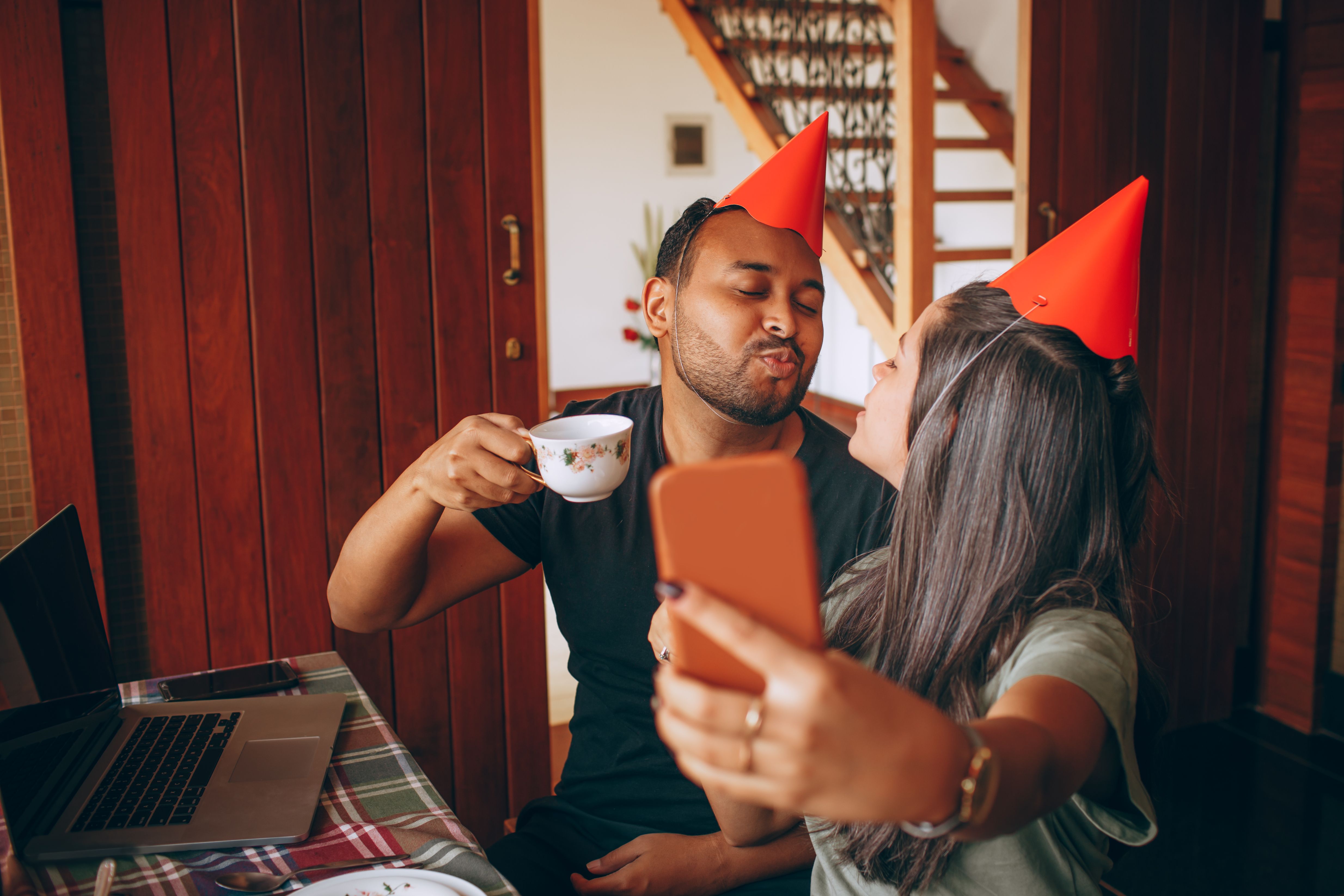 Young Couple Celebrating with Selfie and Tea · Free Stock Photo