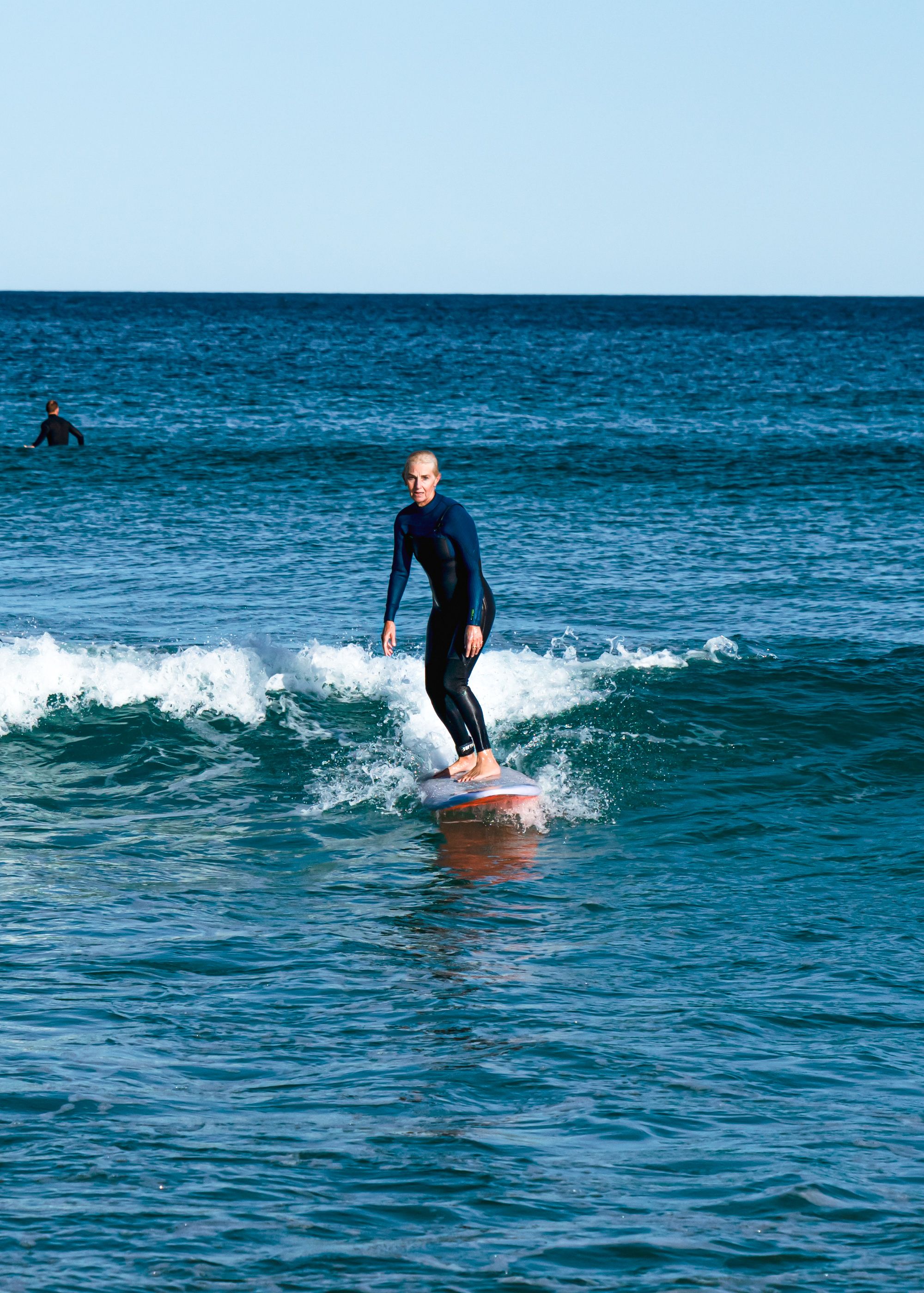 Man on a Surfboard · Free Stock Photo