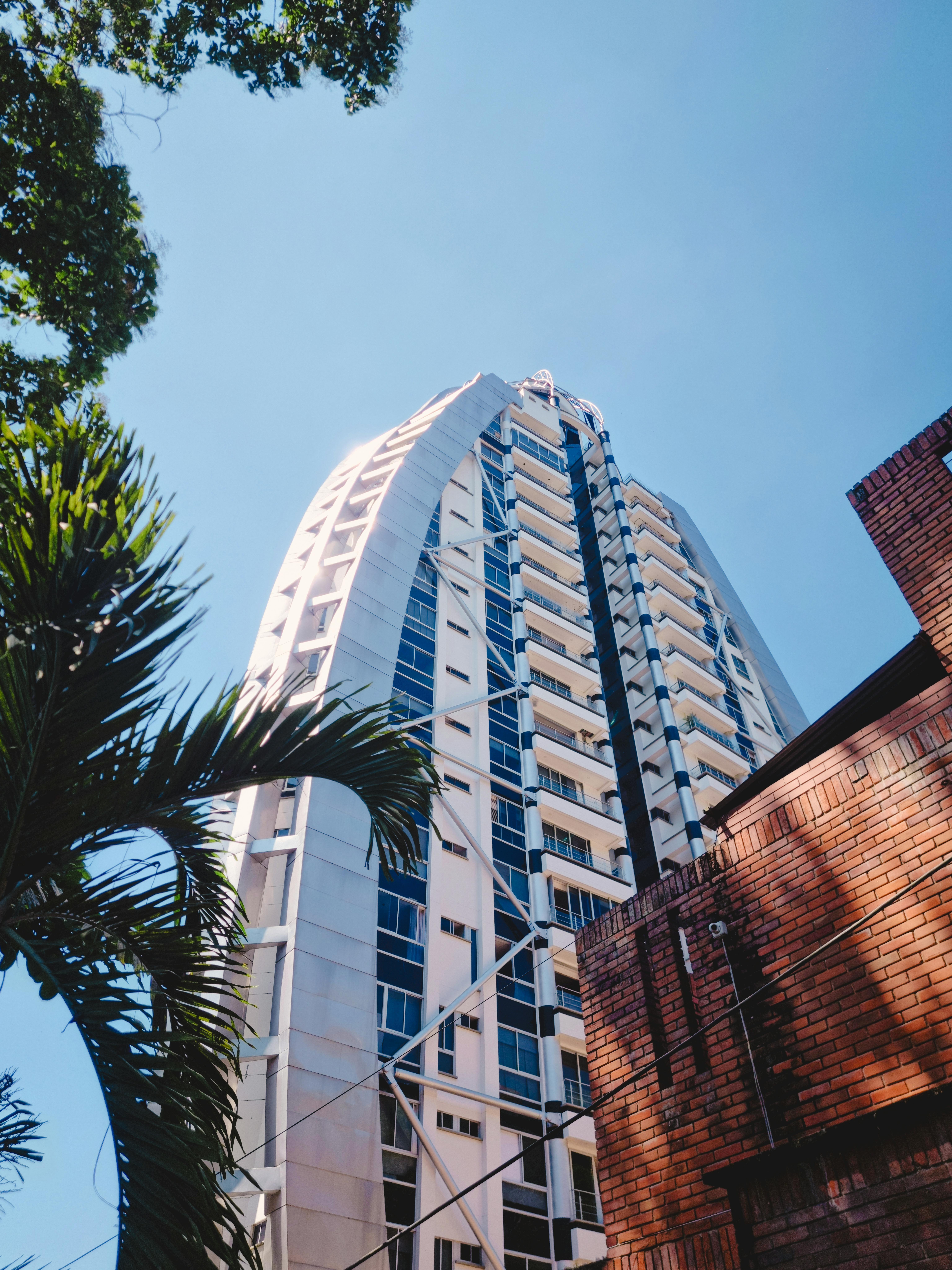 Modern White Skyscraper · Free Stock Photo