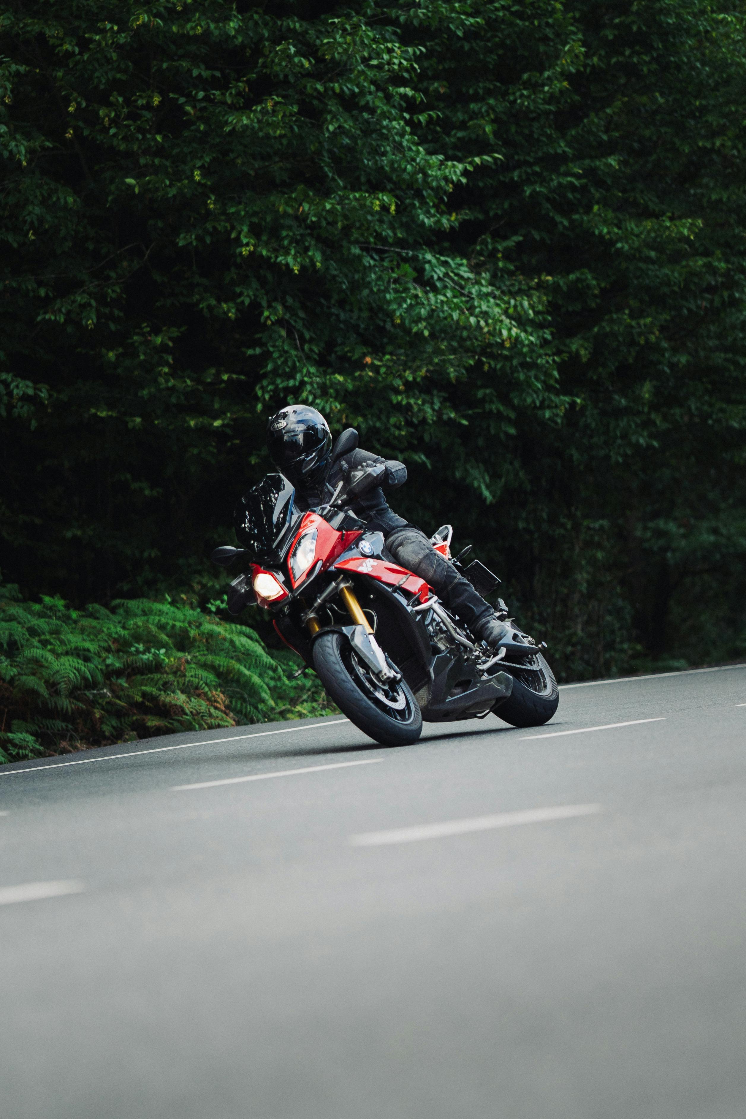 Photo of a Motorcyclist Riding a Ducati Multistrada Motorcycle · Free ...