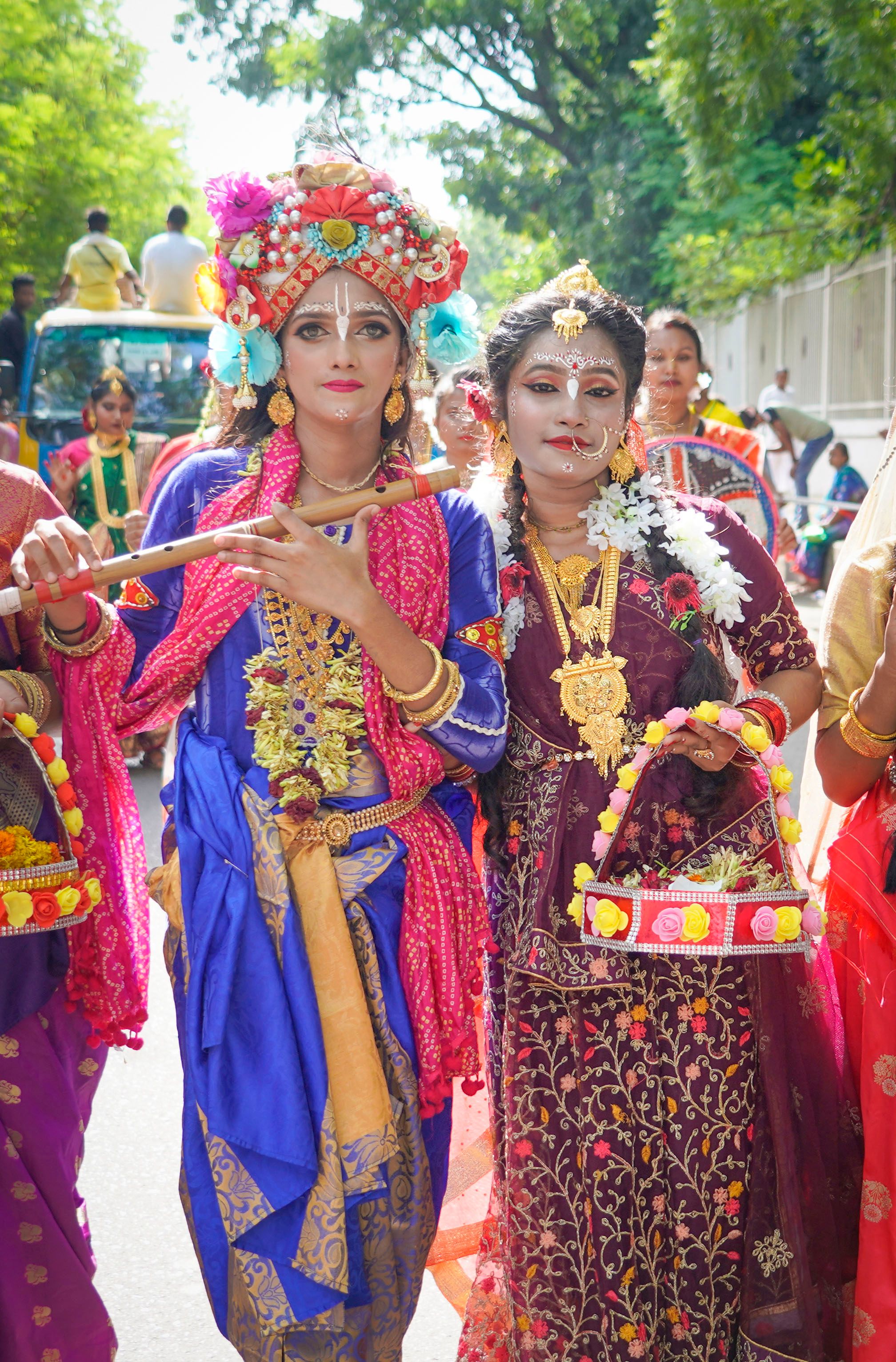 Two women dressed in colorful costumes and holding instruments · Free ...