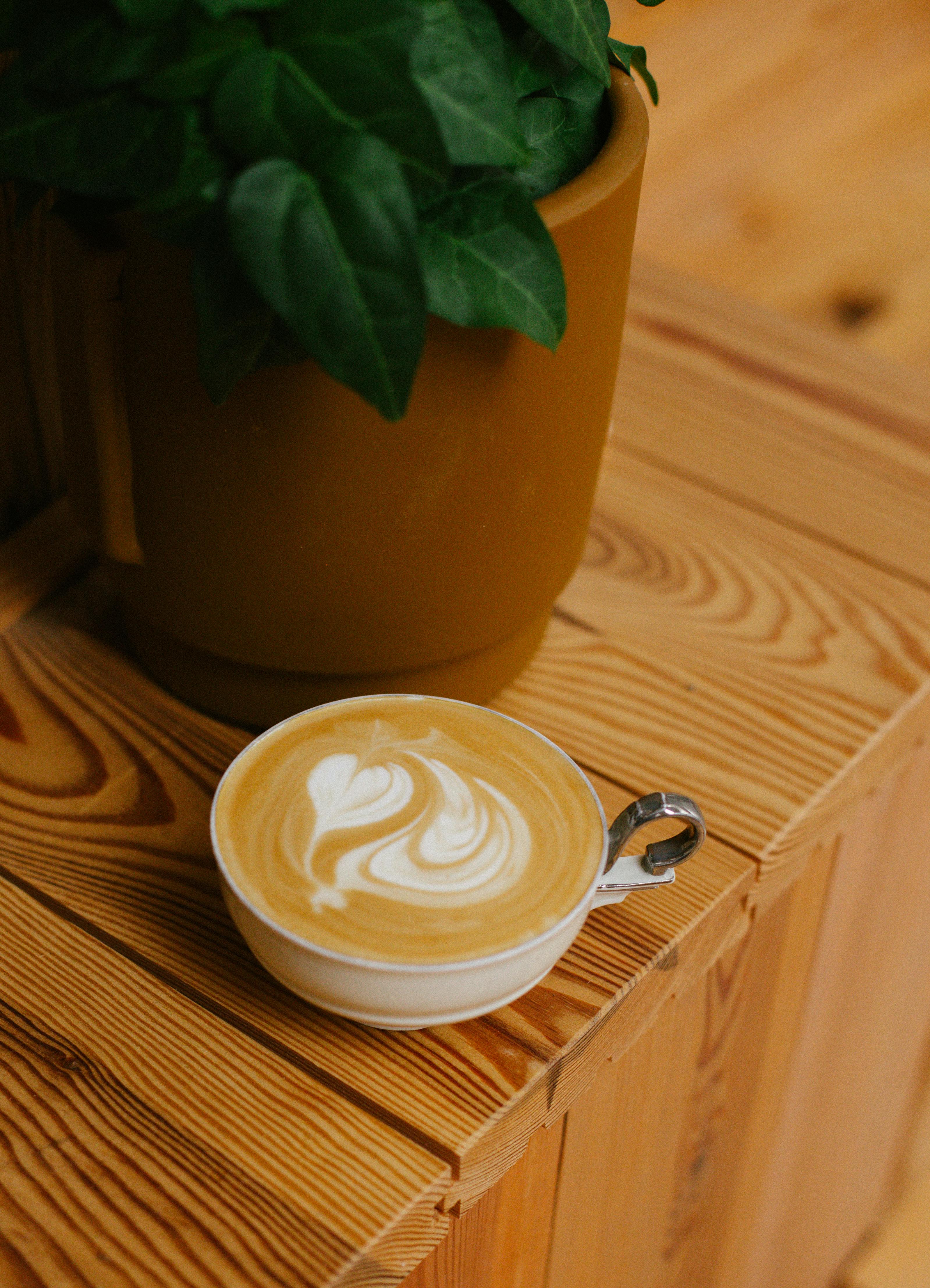 Cappuccino on Black Ceramic Mug · Free Stock Photo