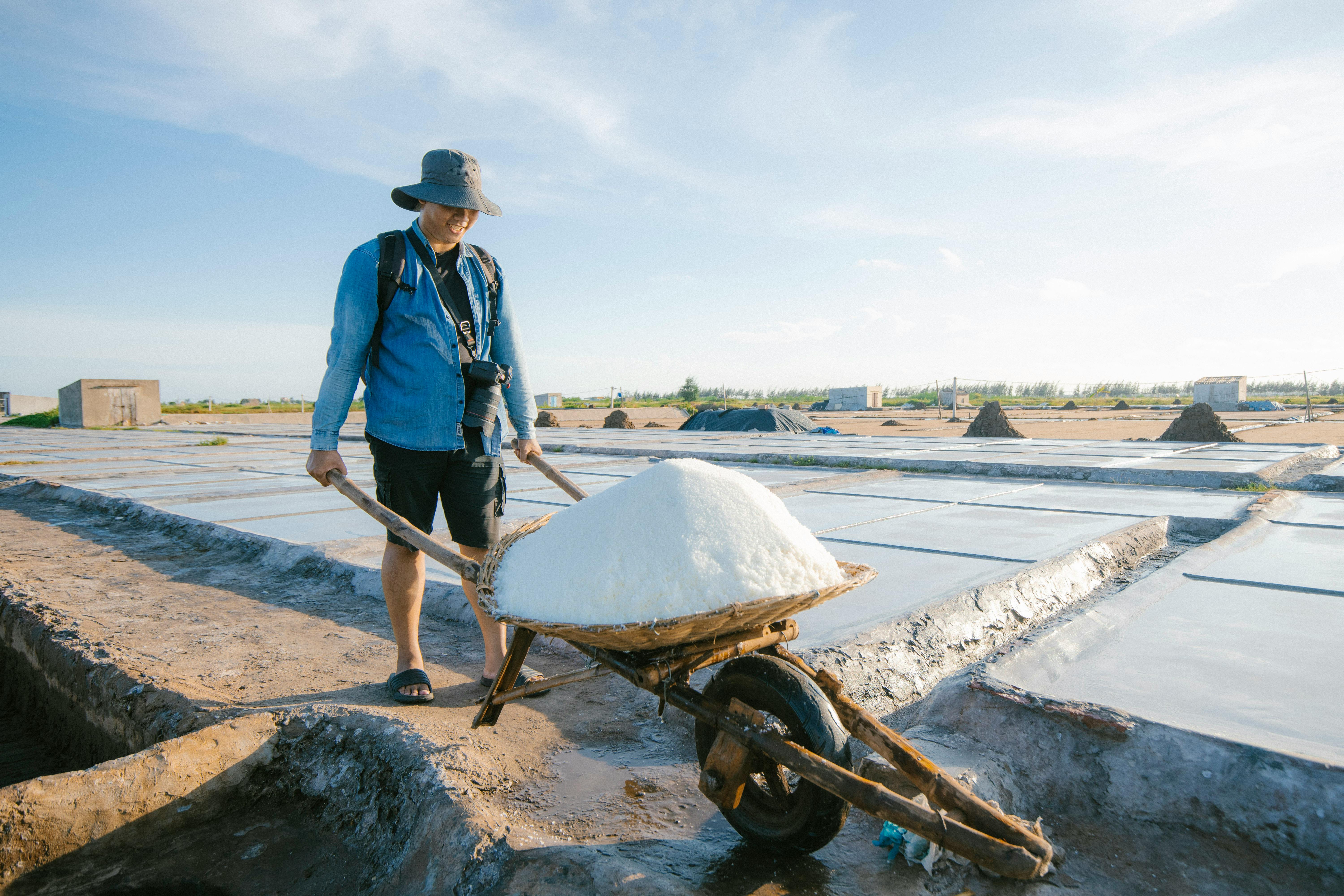Photographer with Wheelbarrel of Salt · Free Stock Photo