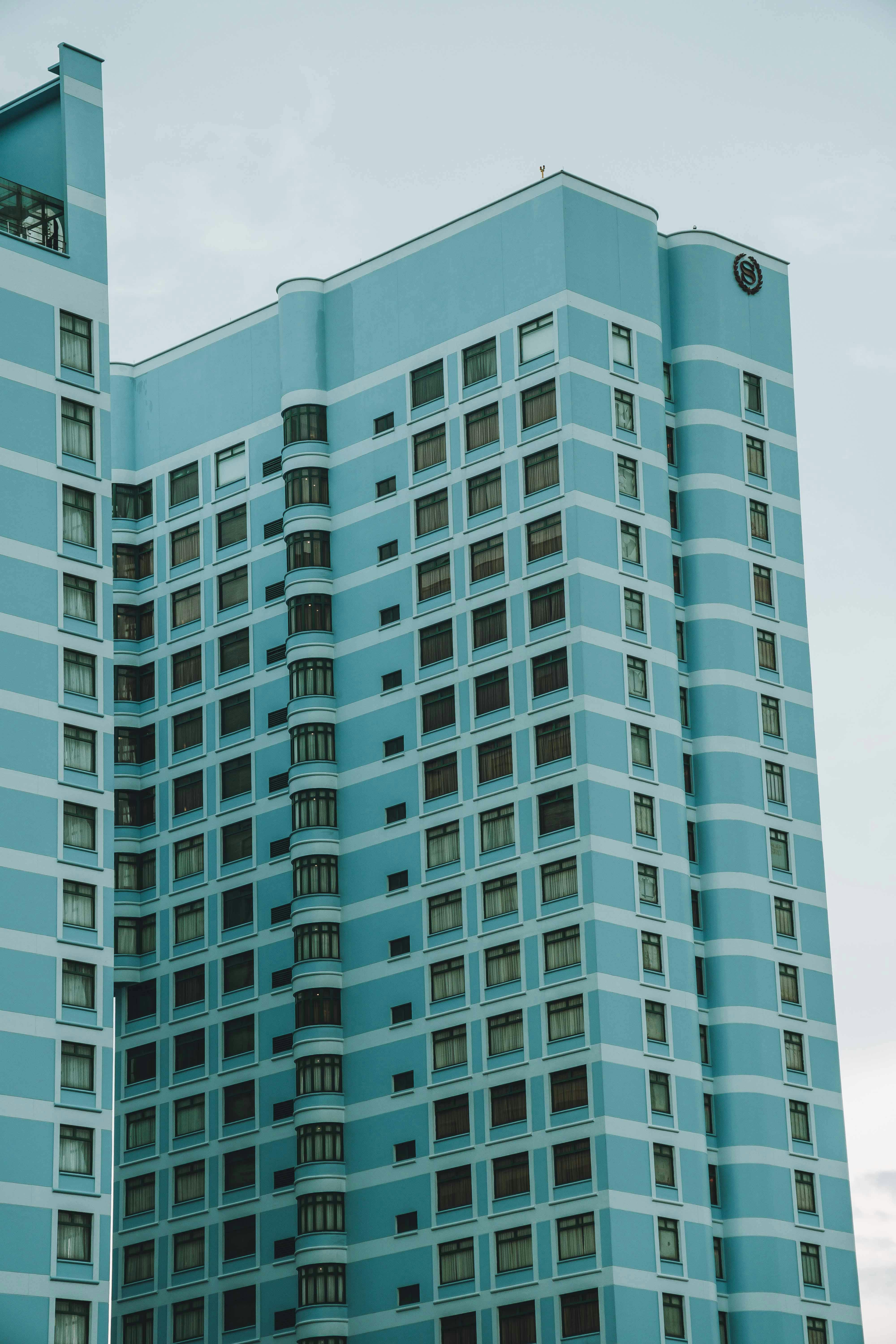 Blue Facade of Sheraton Saigon Grand Opera Hotel · Free Stock Photo