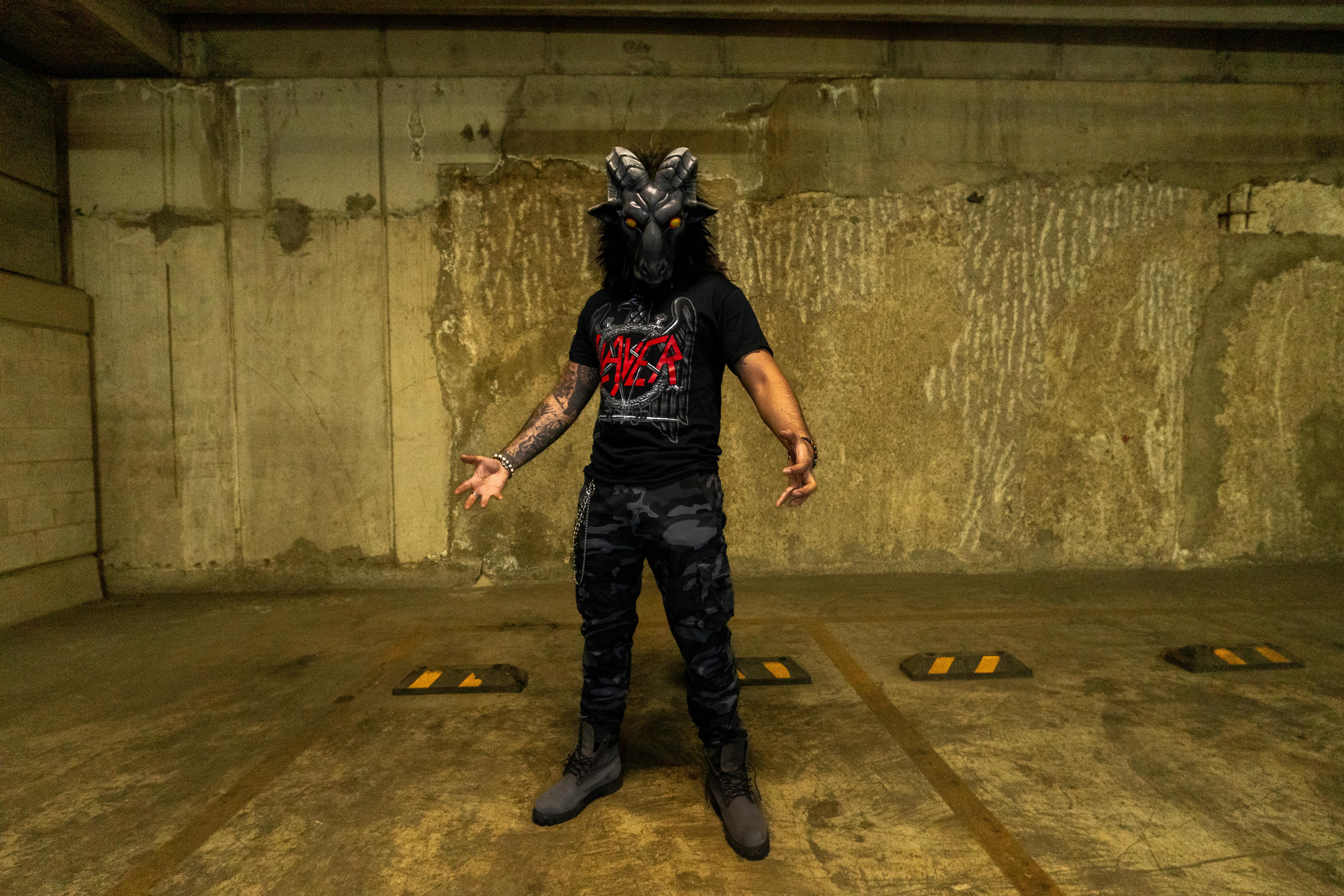 Metalhead Wearing a Goat Mask · Free Stock Photo