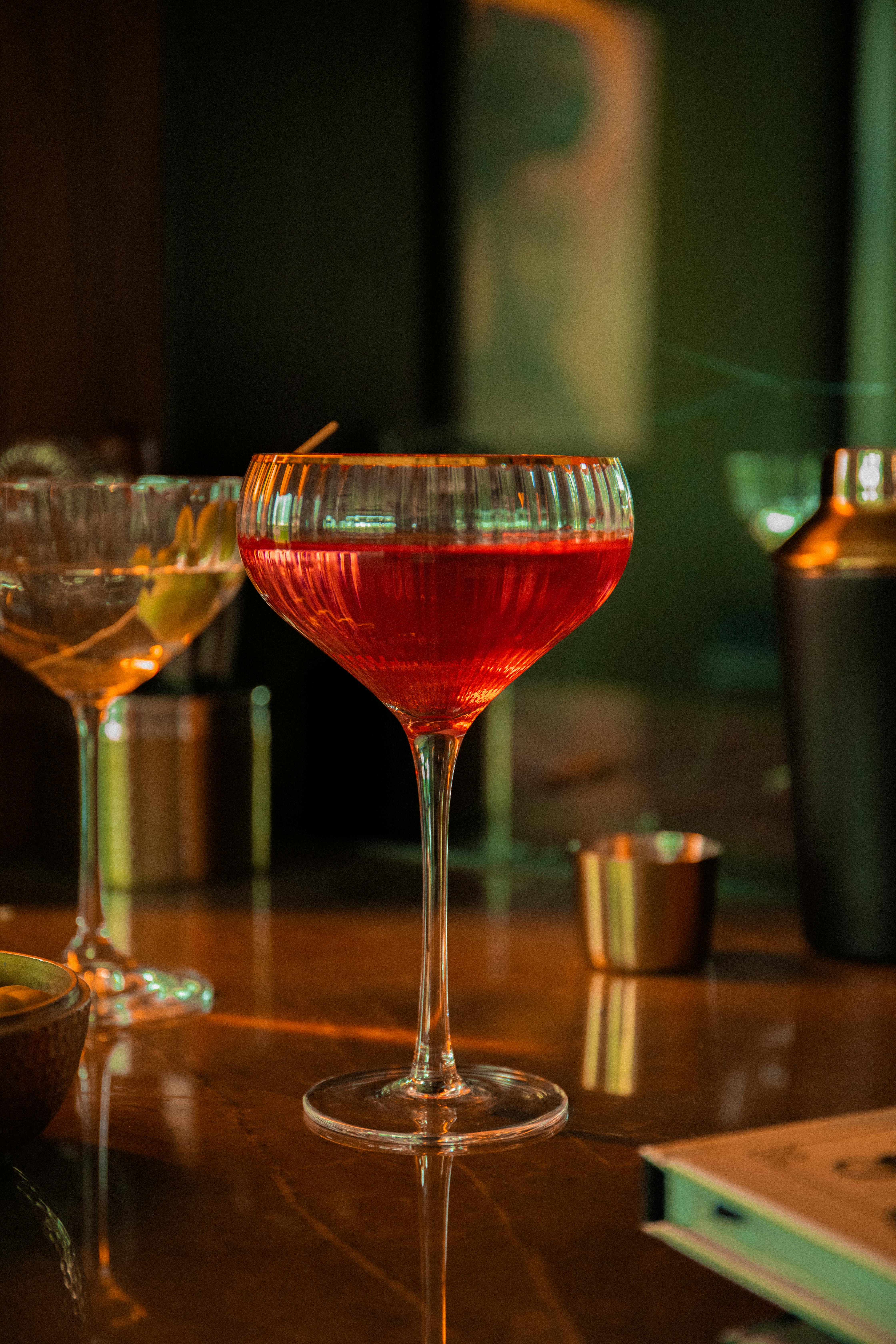 Red Retro Cocktail in Glass on Bar · Free Stock Photo