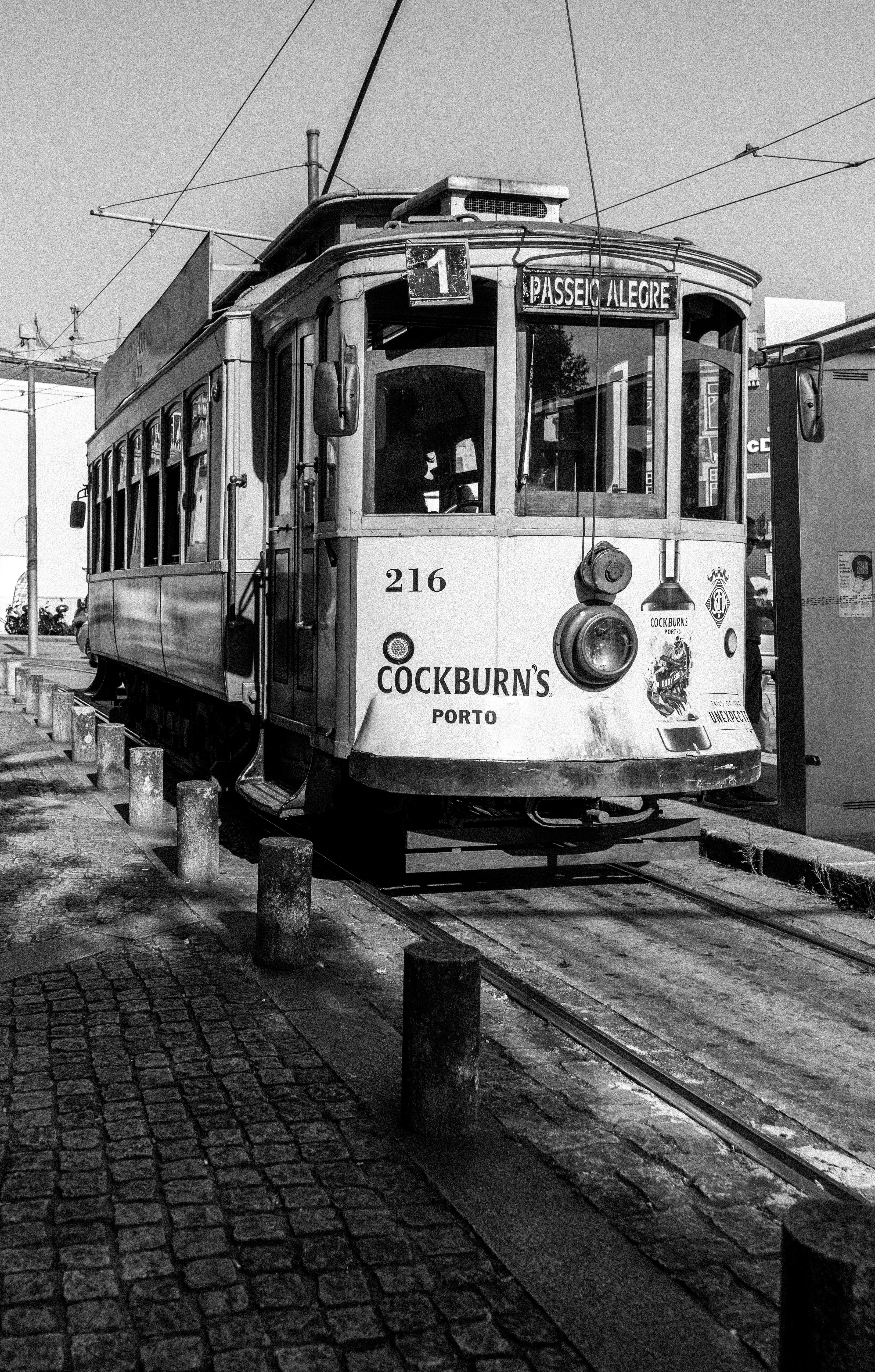 Black and white photo of an old trolley car · Free Stock Photo