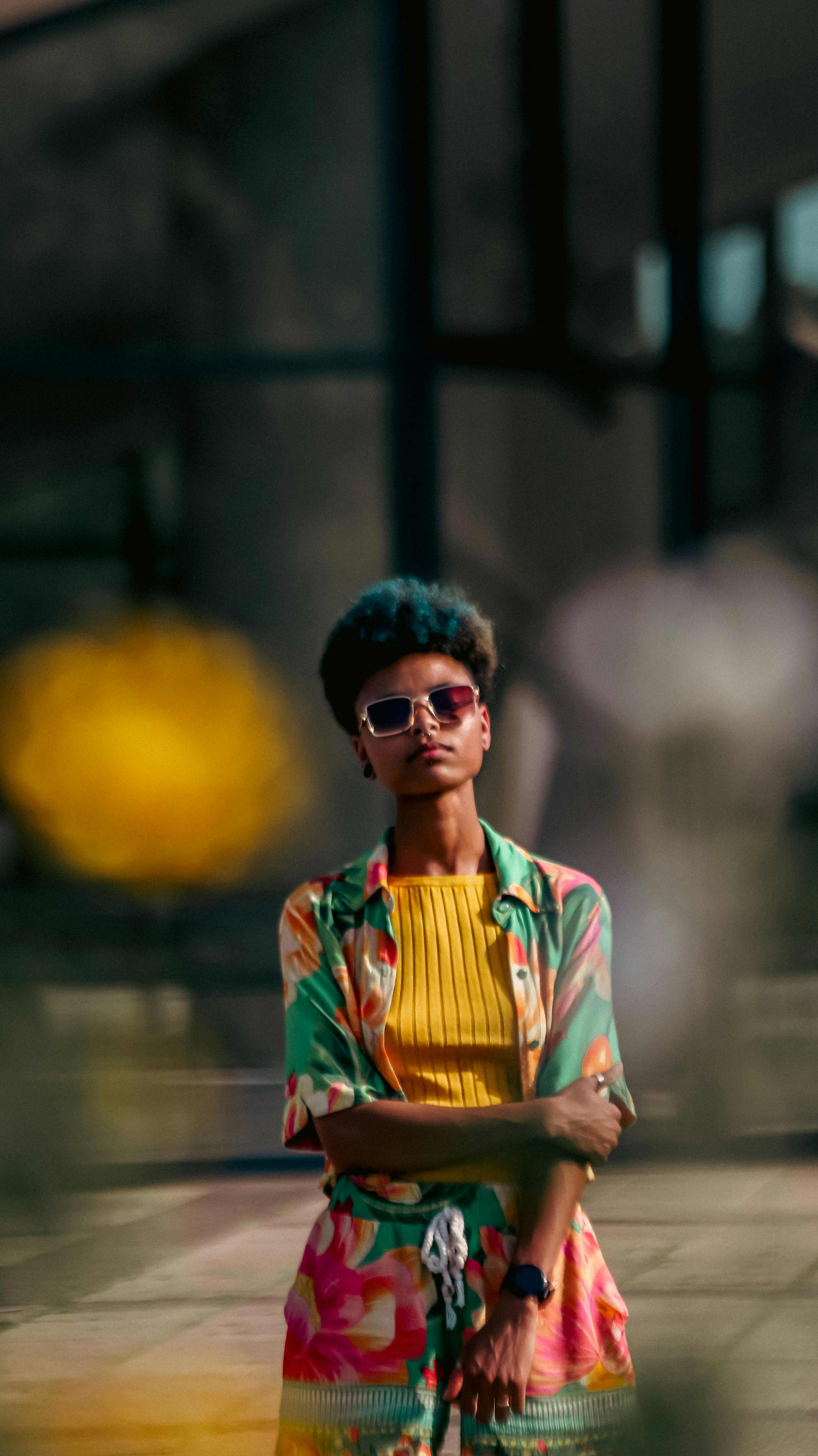 Two Women Standing Near Roller Shutter · Free Stock Photo