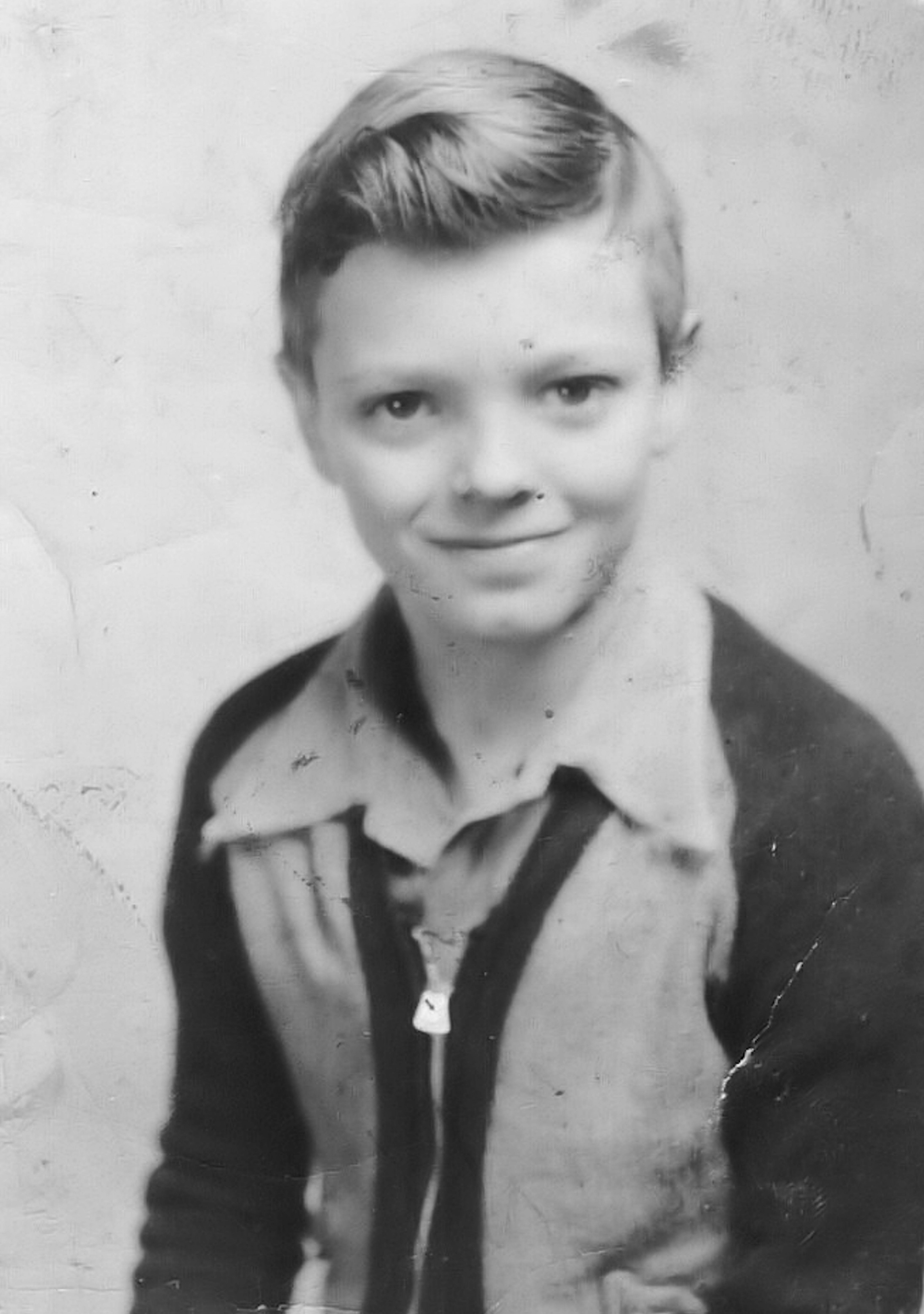 A black and white photo of a young boy · Free Stock Photo
