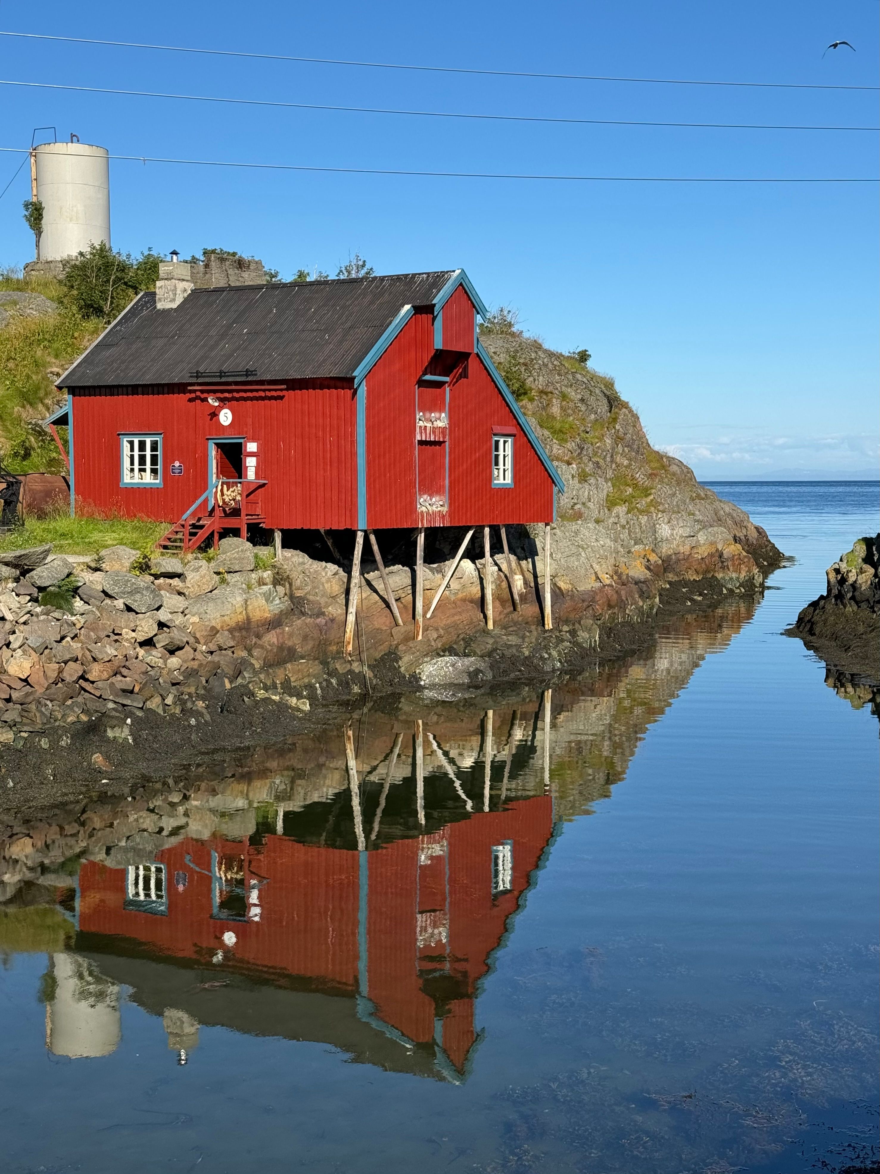 Red Hut on a Small Hill by the Seashore · Free Stock Photo