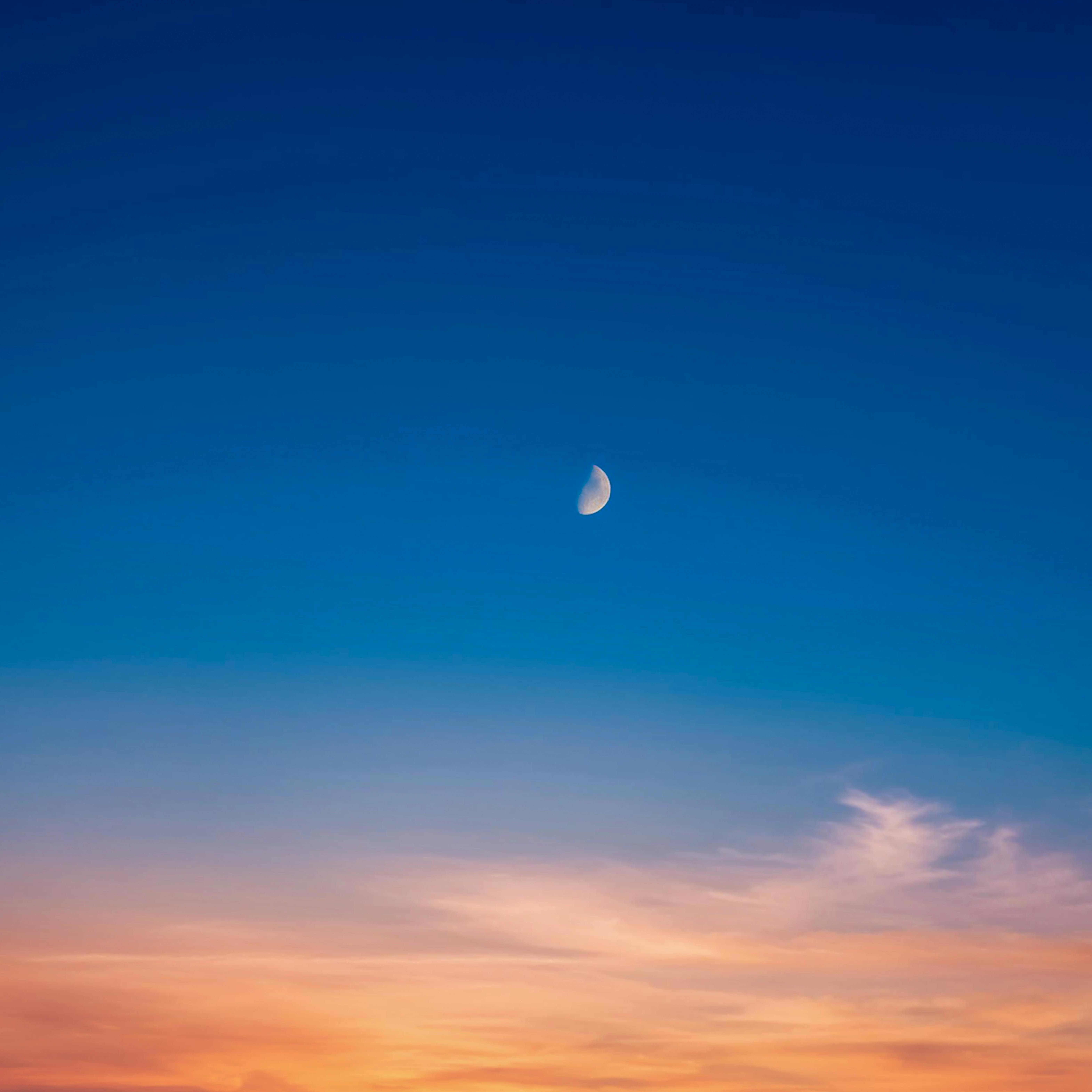 The moon and the sun are seen in the sky · Free Stock Photo