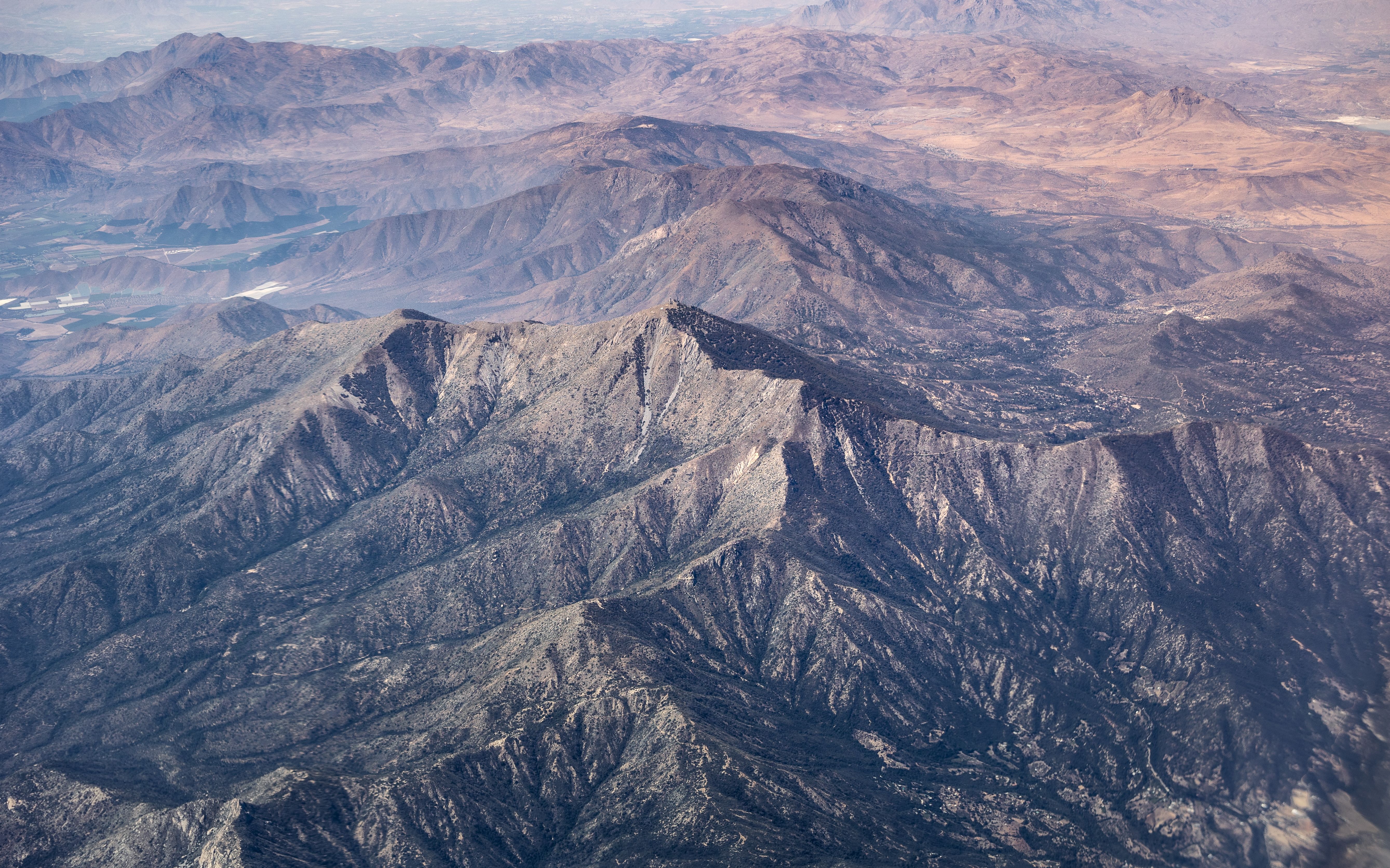 Birds Eye View of Barren Mountains Peaks · Free Stock Photo