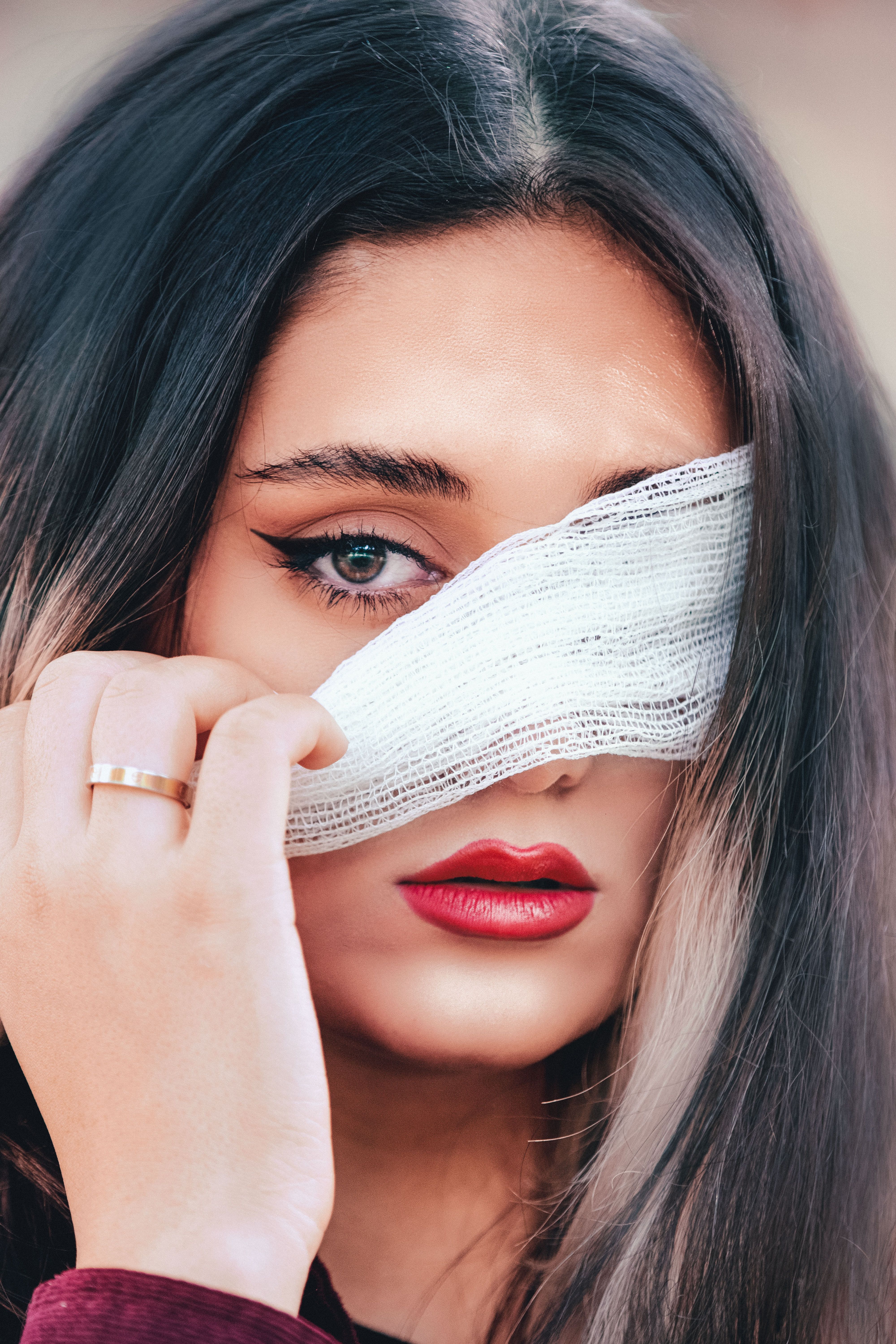 Brunette Woman with Bandage on Eye · meta.free_stock.photo